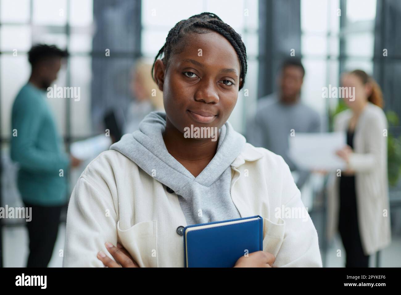 Female African American job seeker keeping a folder with CV Stock Photo ...