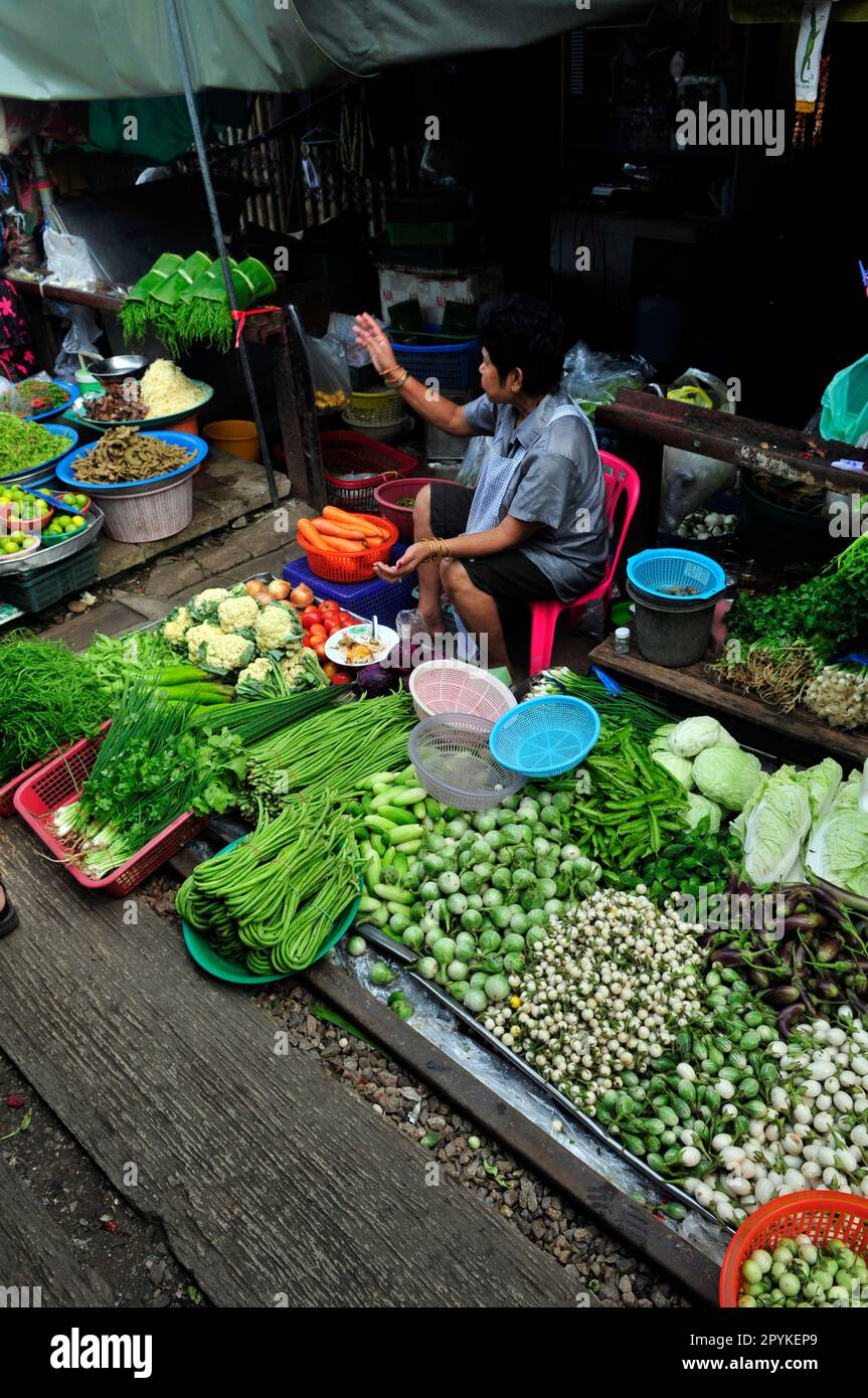 The colorful Mae Klong Railway Market Southwest of Bangkok, Thailand ...