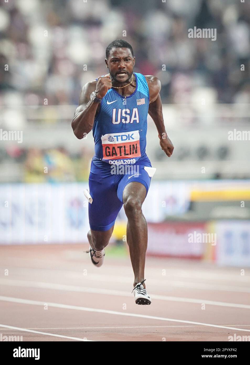 Justin Gatlin running the 100m at the 2019 World Athletics ...