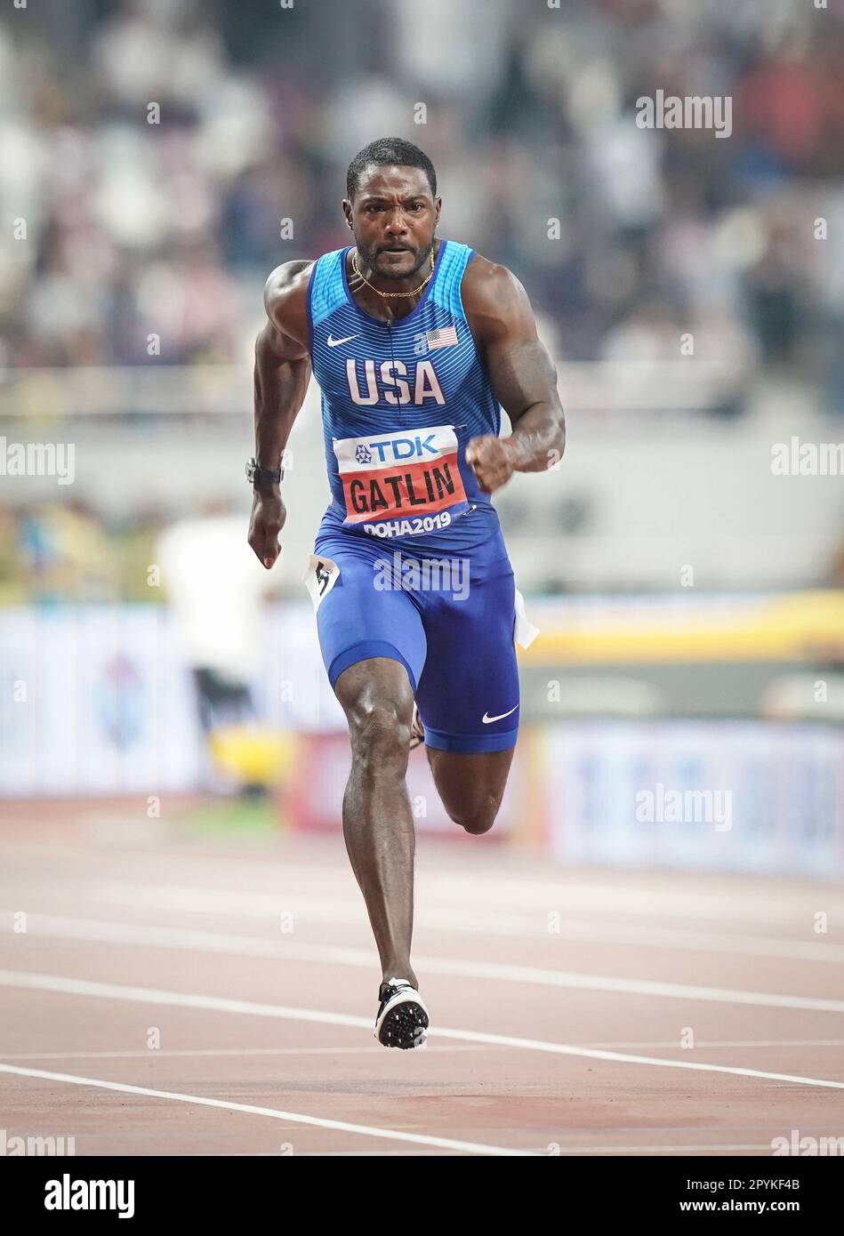 Justin Gatlin running the 100m at the 2019 World Athletics ...