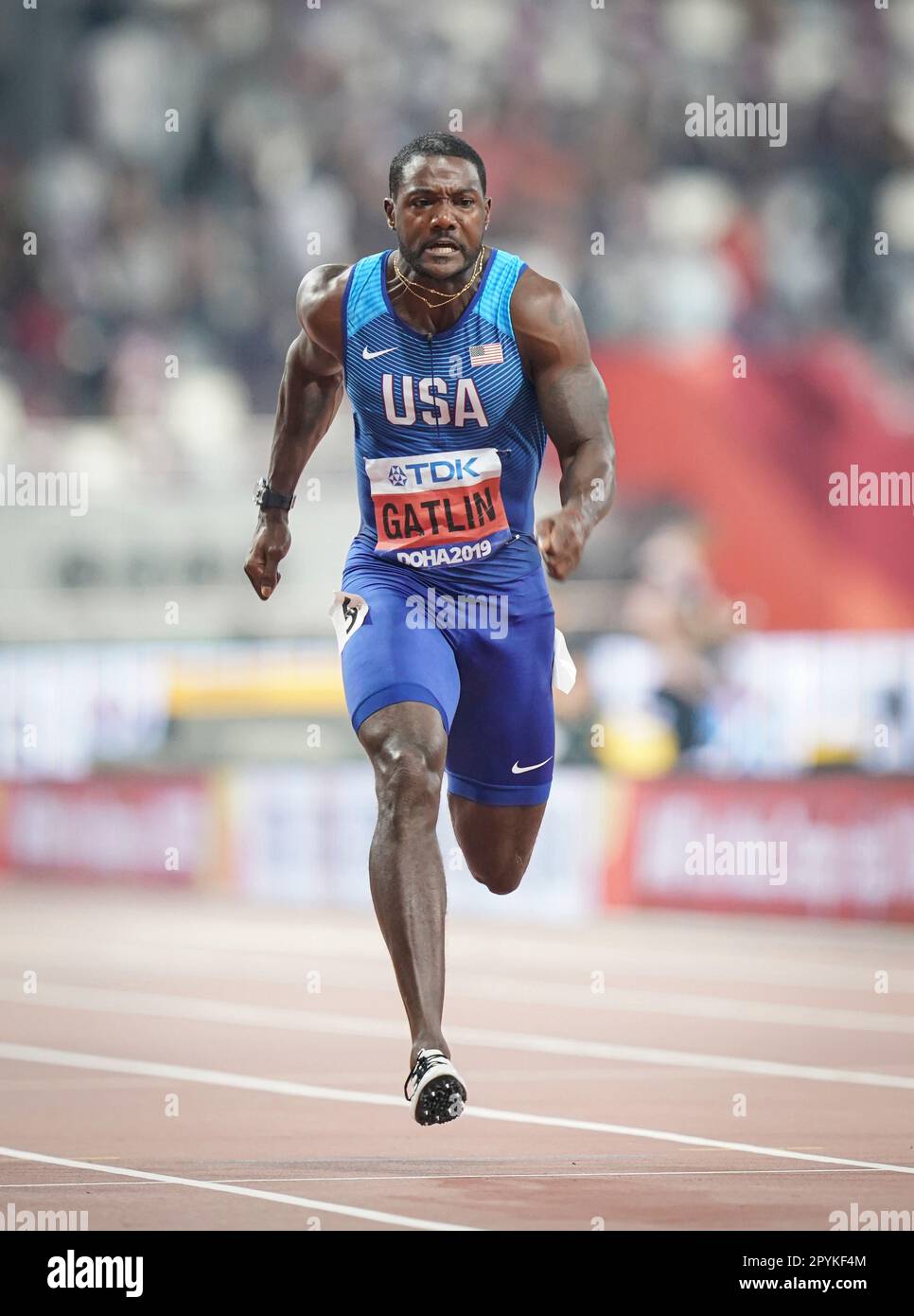 Justin Gatlin running the 100m at the 2019 World Athletics ...
