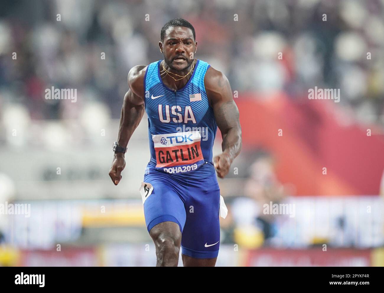 Justin Gatlin running the 100m at the 2019 World Athletics ...
