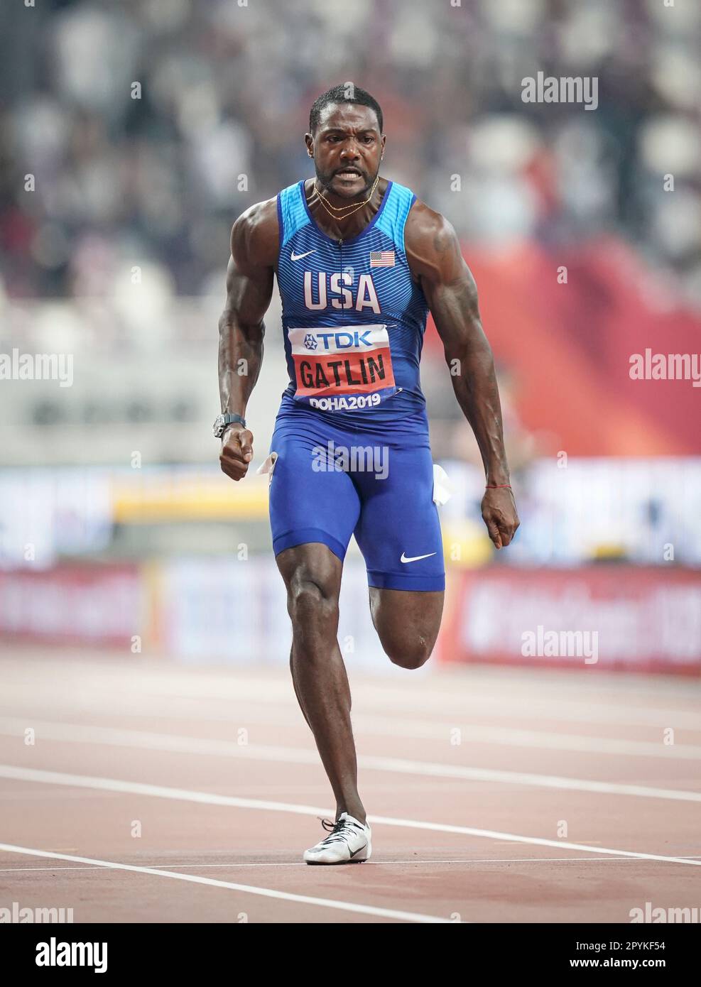 Justin Gatlin running the 100m at the 2019 World Athletics ...