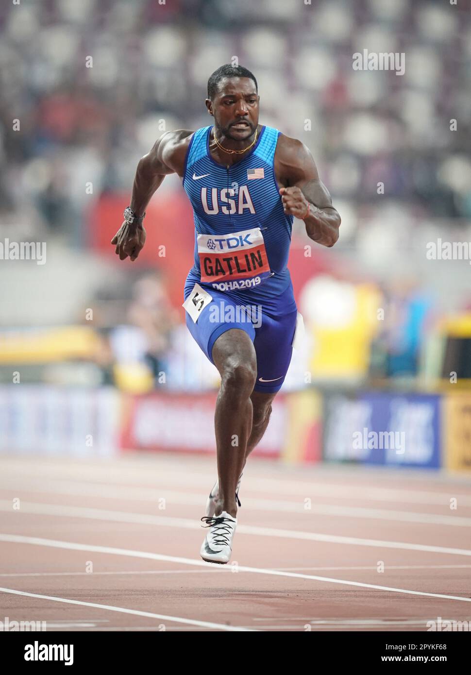 Justin Gatlin running the 100m at the 2019 World Athletics ...