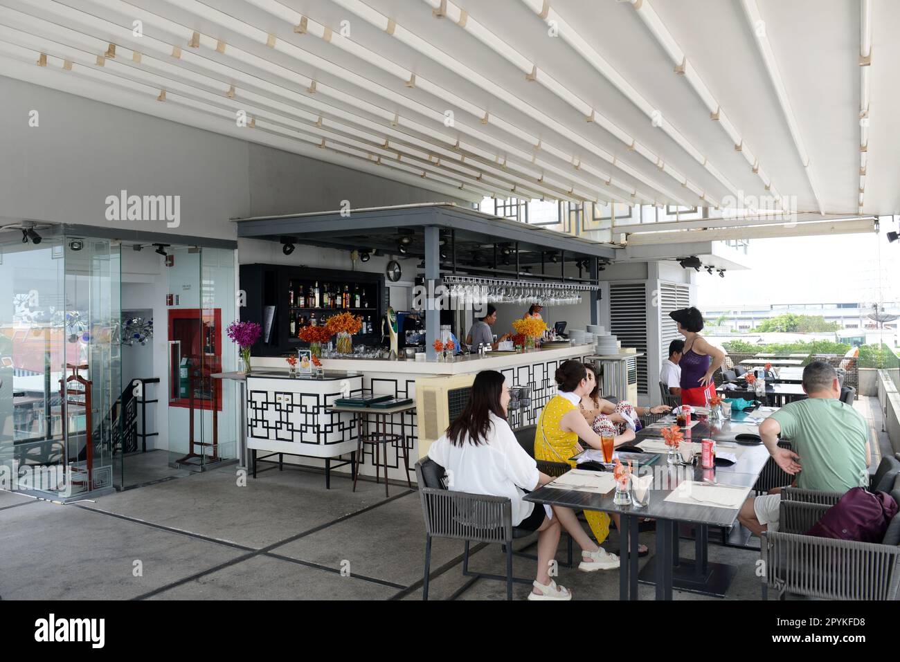 Enjoying cocktails & drinks on the stylish rooftop bar of the Riva Arun ...