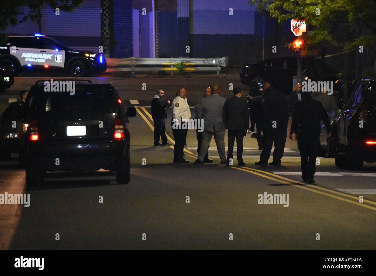 Investigators Gather Clues At The Scene Of The Crime Four People