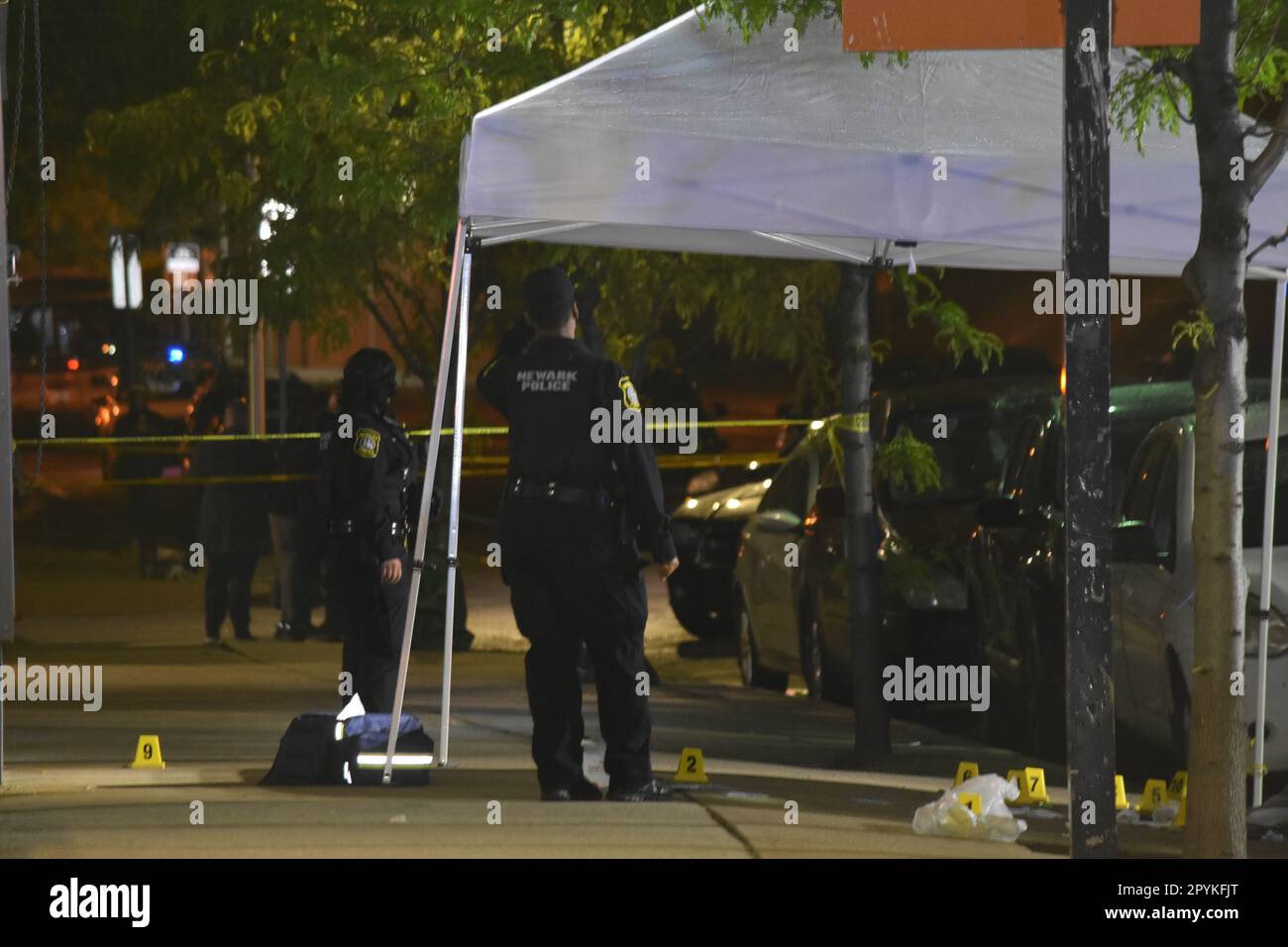 Evidence markers at the crime scene in Newark, New Jersey Wednesday ...