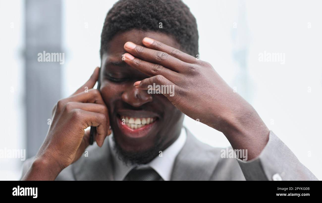 Portrait of a serious entrepreneur making a phone call Stock Photo - Alamy