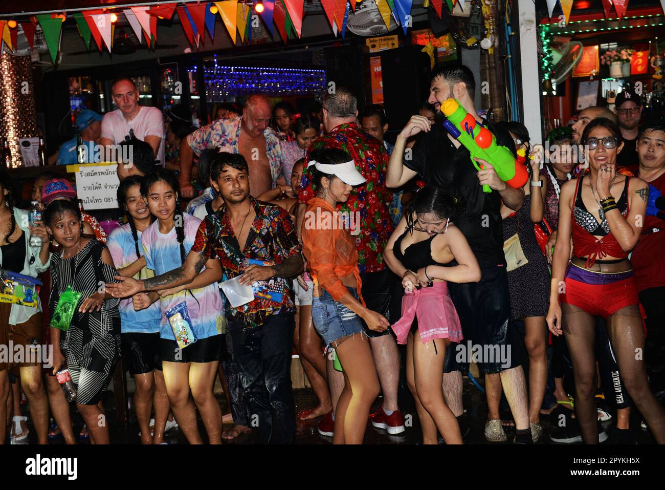 Celebrating Songkran ( Thai New Year ) by the bars on Soi 8 of ...