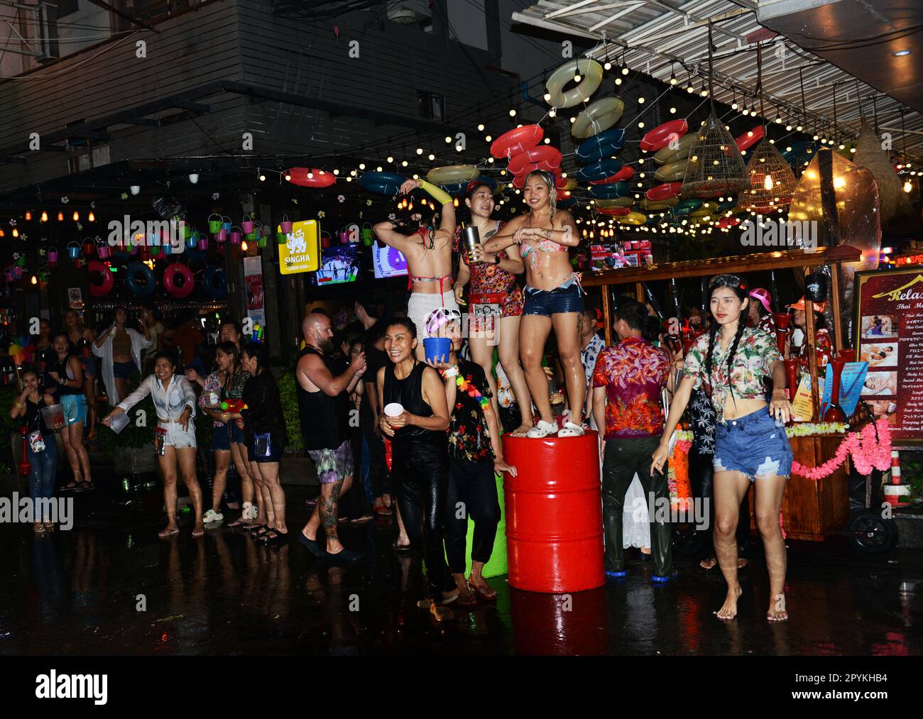 Celebrating Songkran ( Thai New Year ) by the bars on Soi 8 of ...