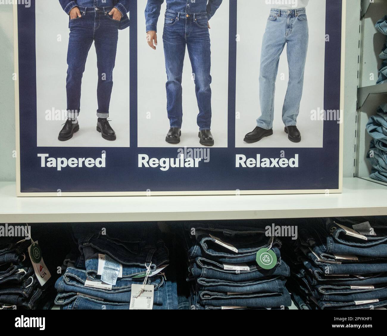 Denim jeans store display for men: tapered, regular, relaxed, skinny ...