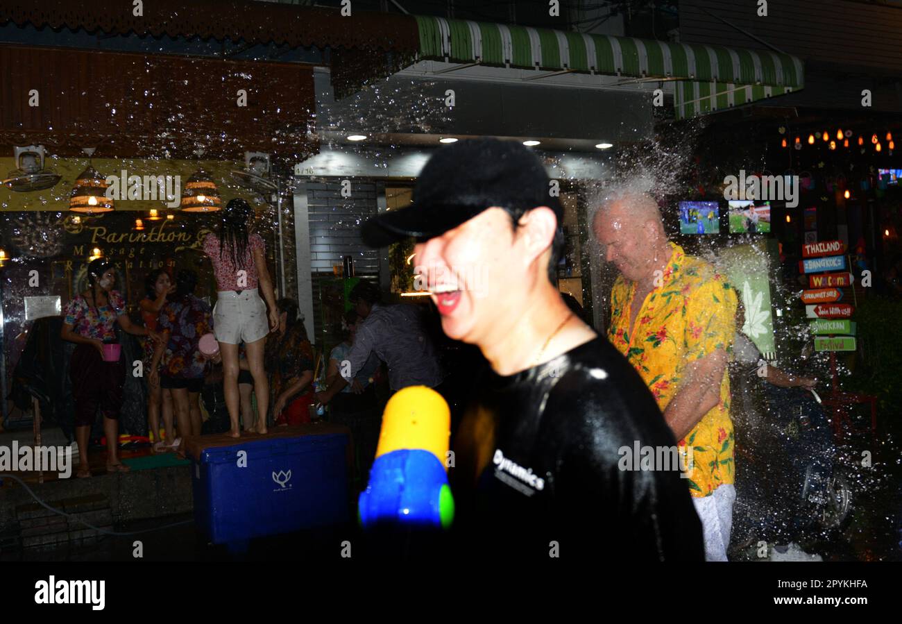 Celebrating Songkran ( Thai New Year ) by the bars on Soi 8 of ...