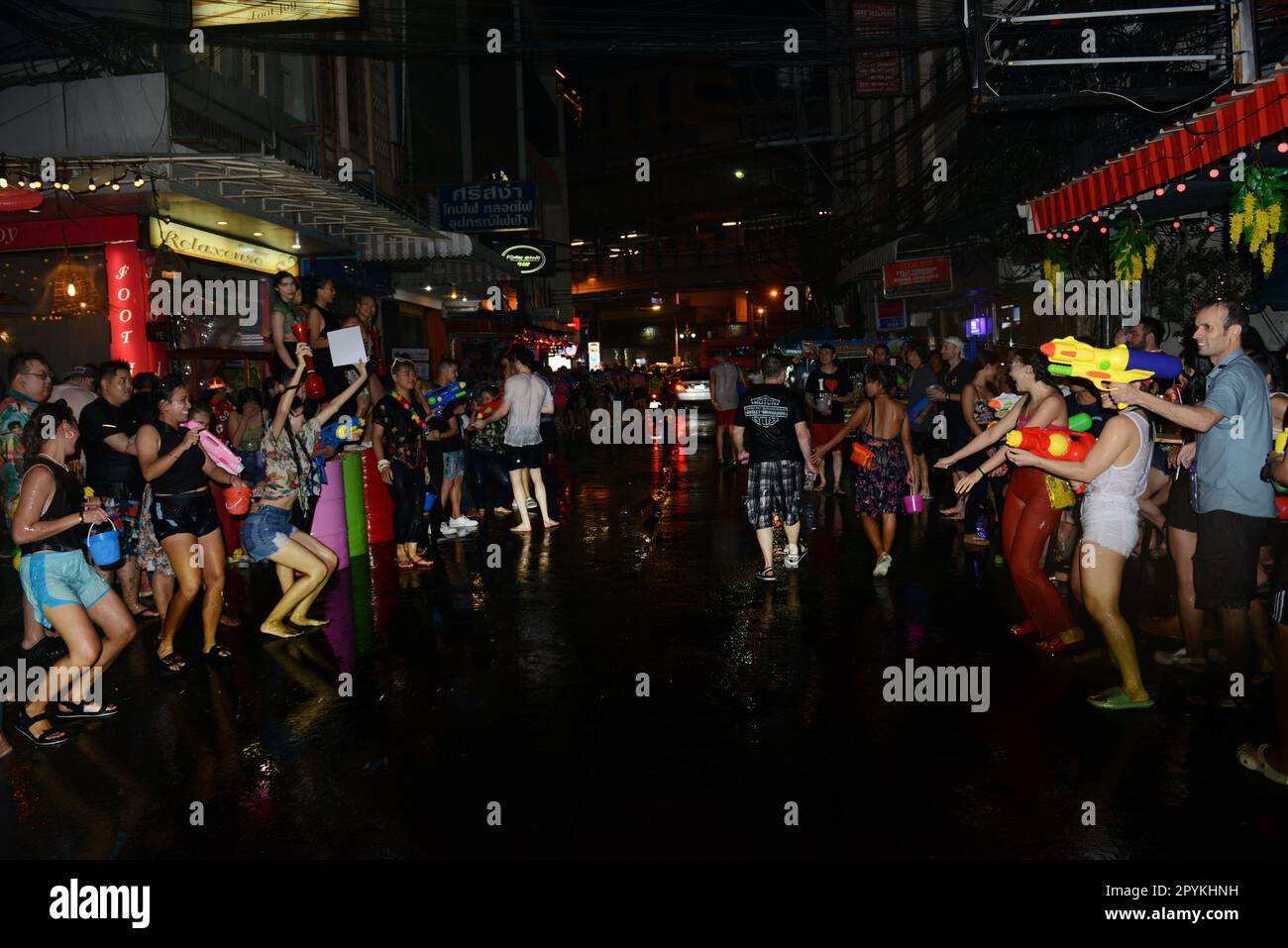 Celebrating Songkran ( Thai New Year ) by the bars on Soi 8 of ...