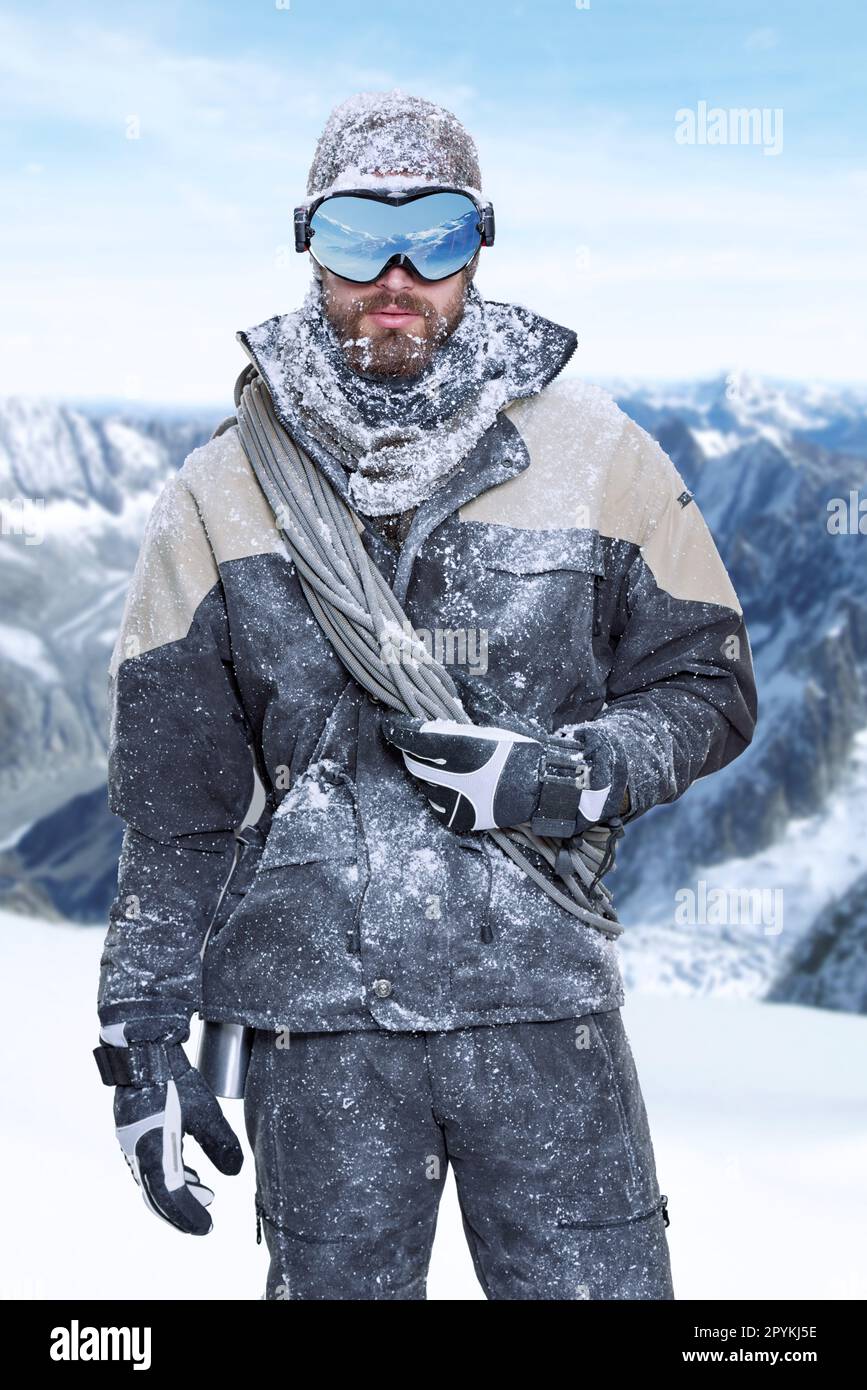 Nature, portrait and man in snow with climbing gear during winter, cold ...
