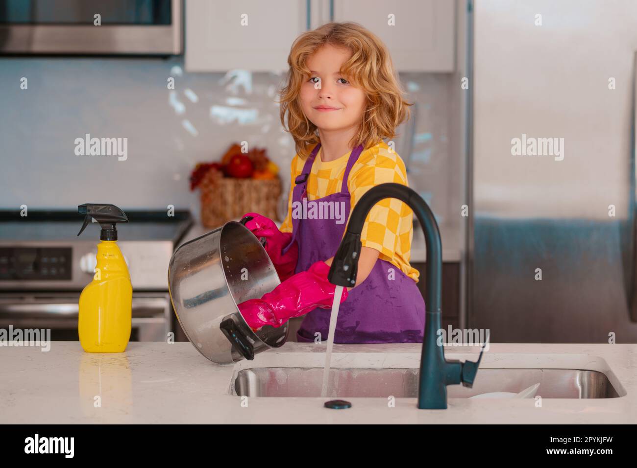 Little kid cleaning at home. Child doing housework having fun. Cute ...