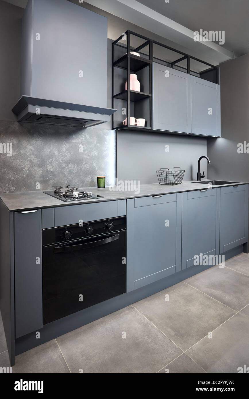 Blue grey contemporary kitchen linearlayout with hood two burners gas ...