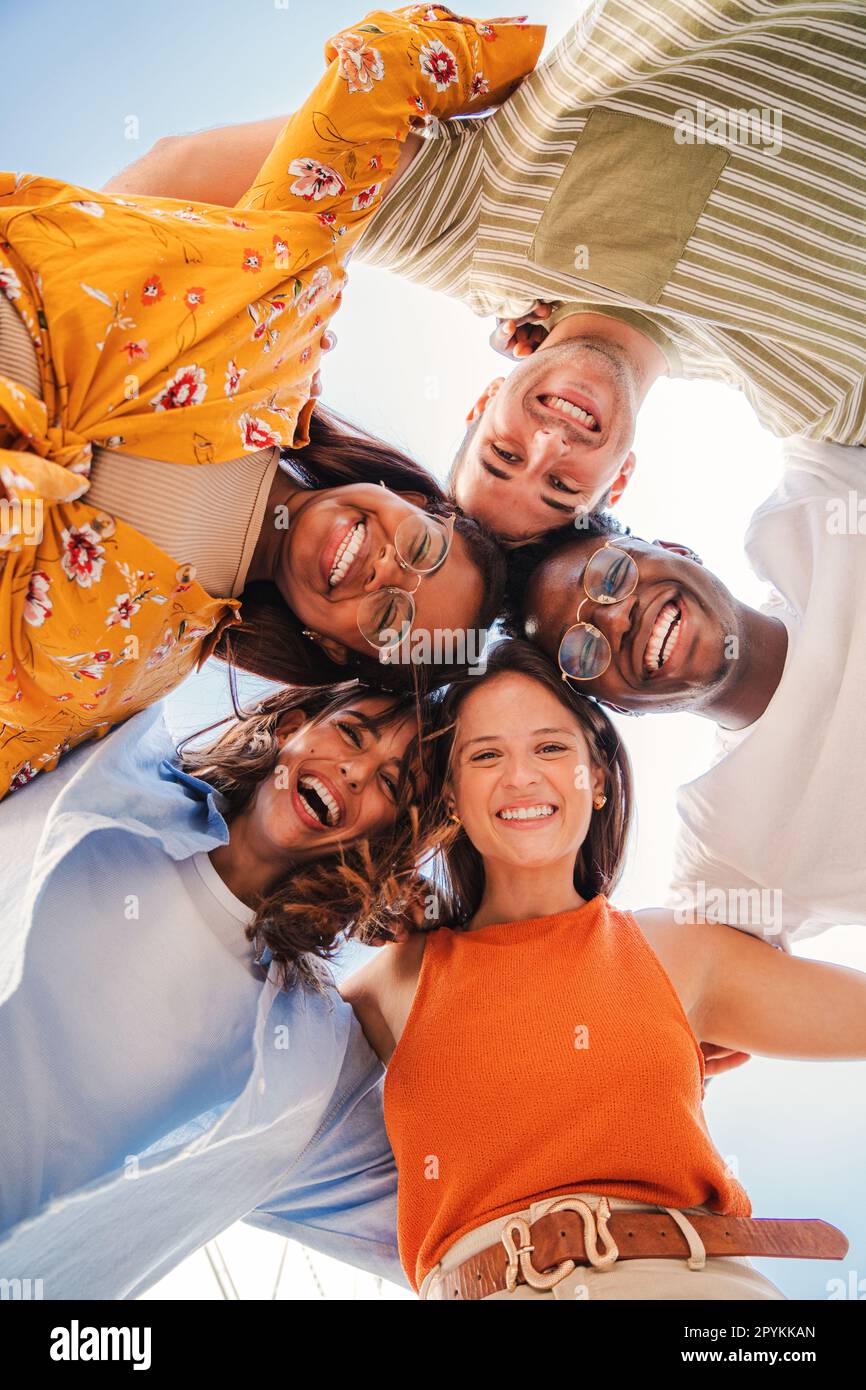 Group of people embracing in a circle hi-res stock photography and ...