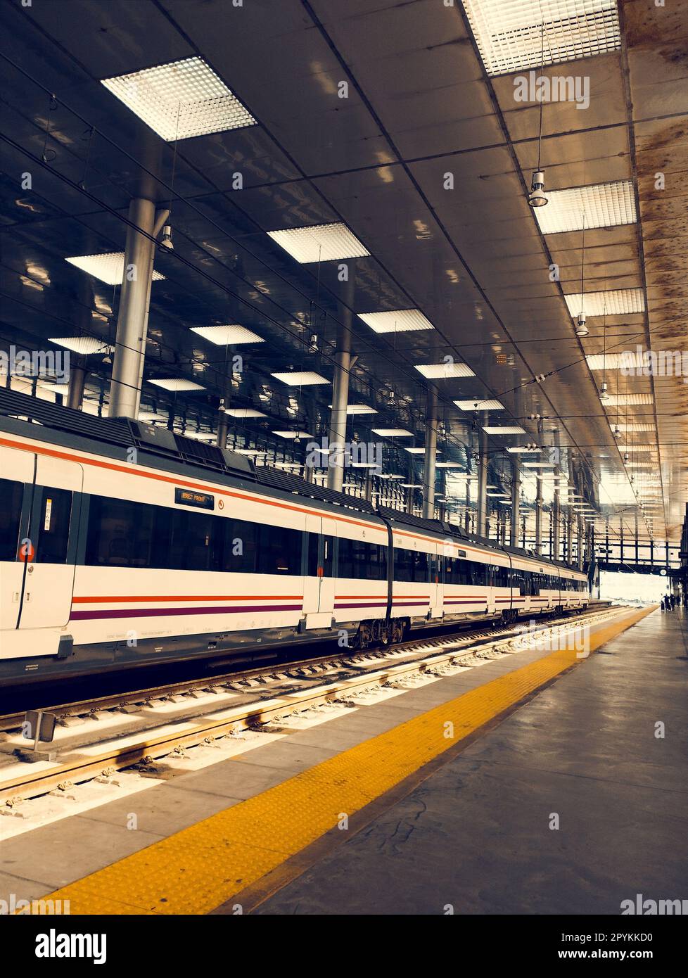A commuter train on the platform Stock Photo - Alamy