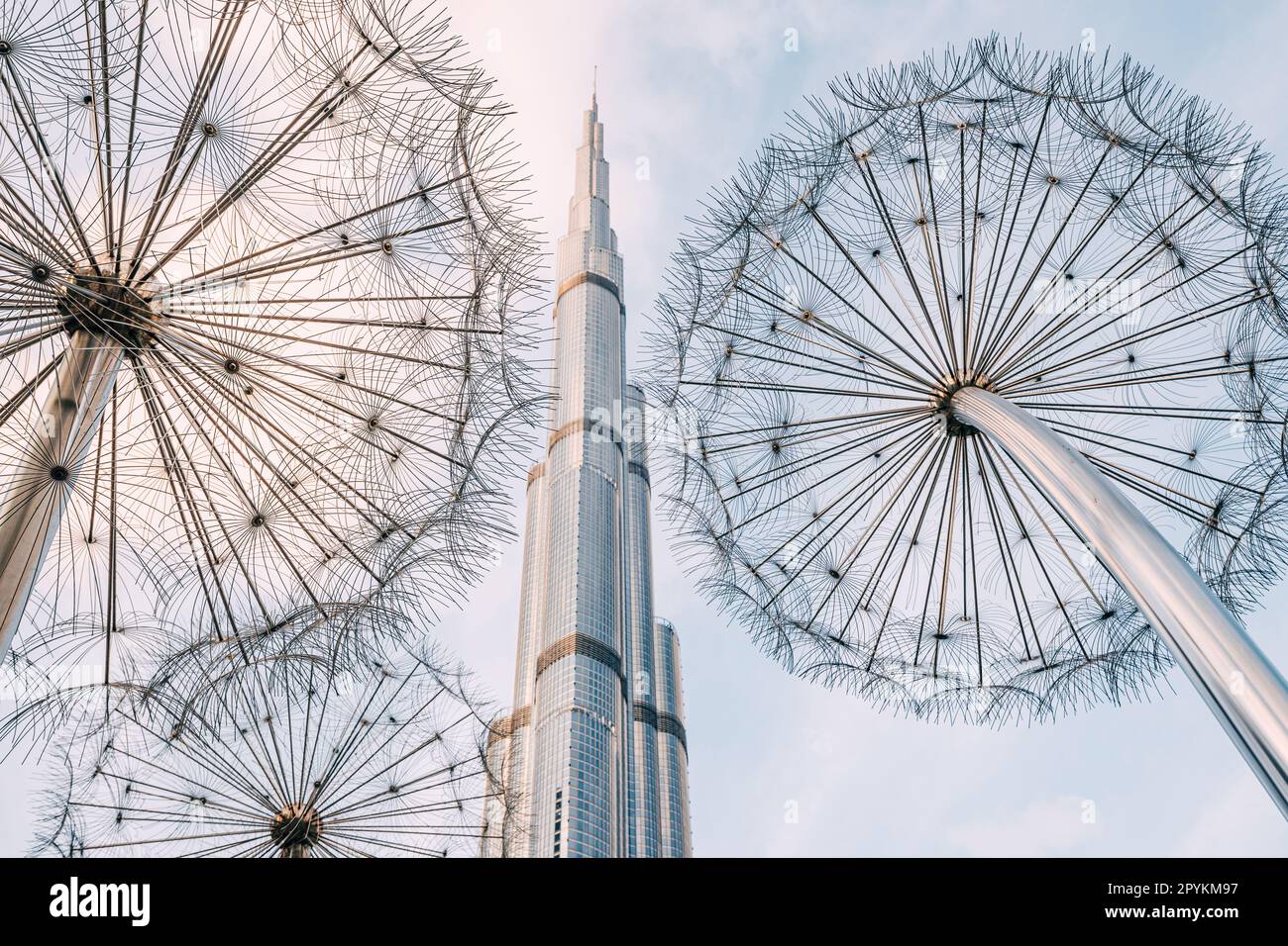 Famous Burj Khalifa skyscraper tower and dandelion sculptures on the ...