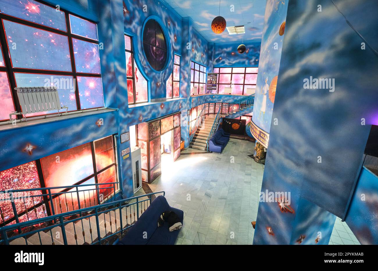 The double height front atrium, lobby, interior entrance space with sky ...