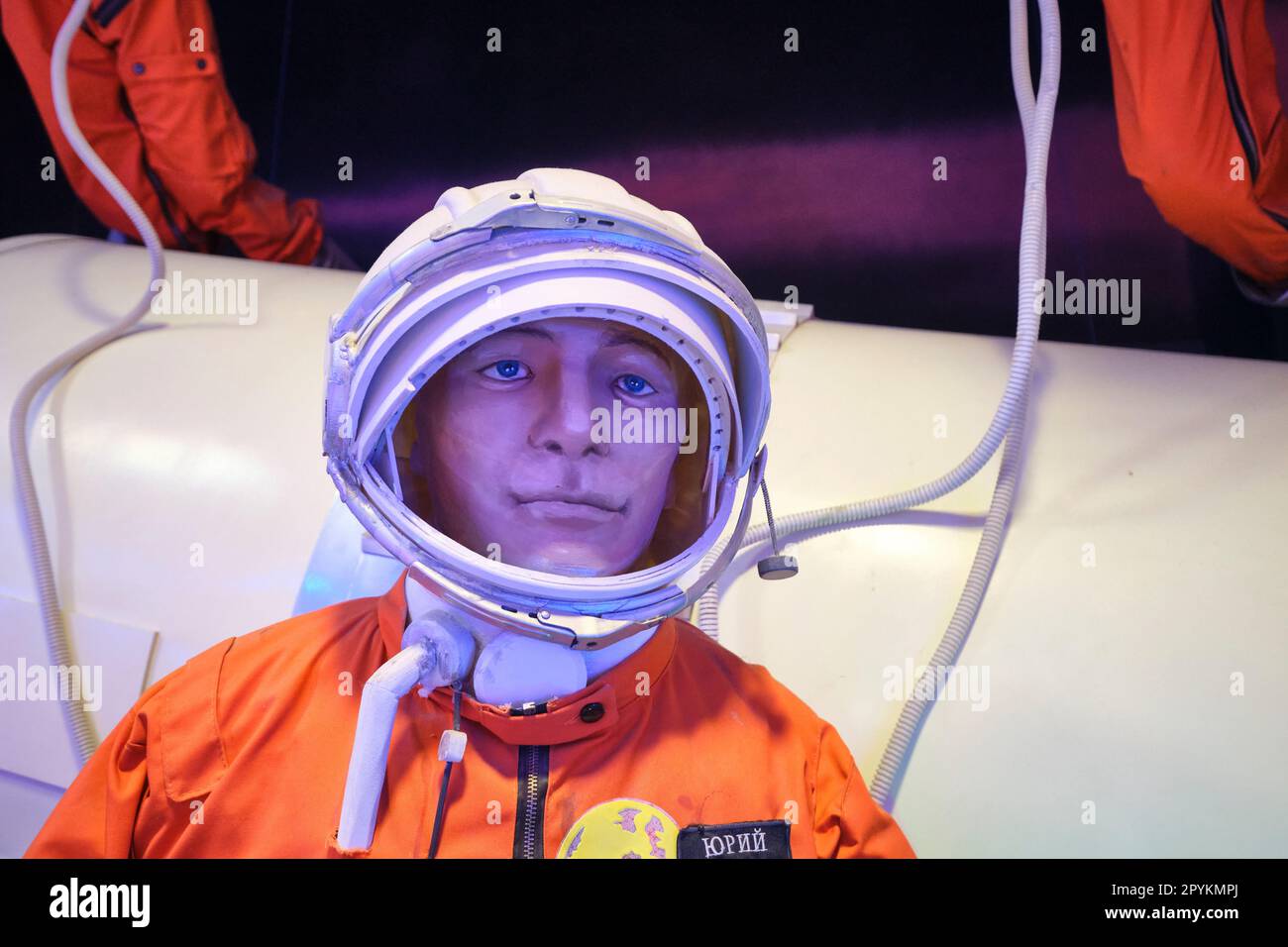 A portrait of a typical Russian cosmonaut with open helmet. A diorama ...