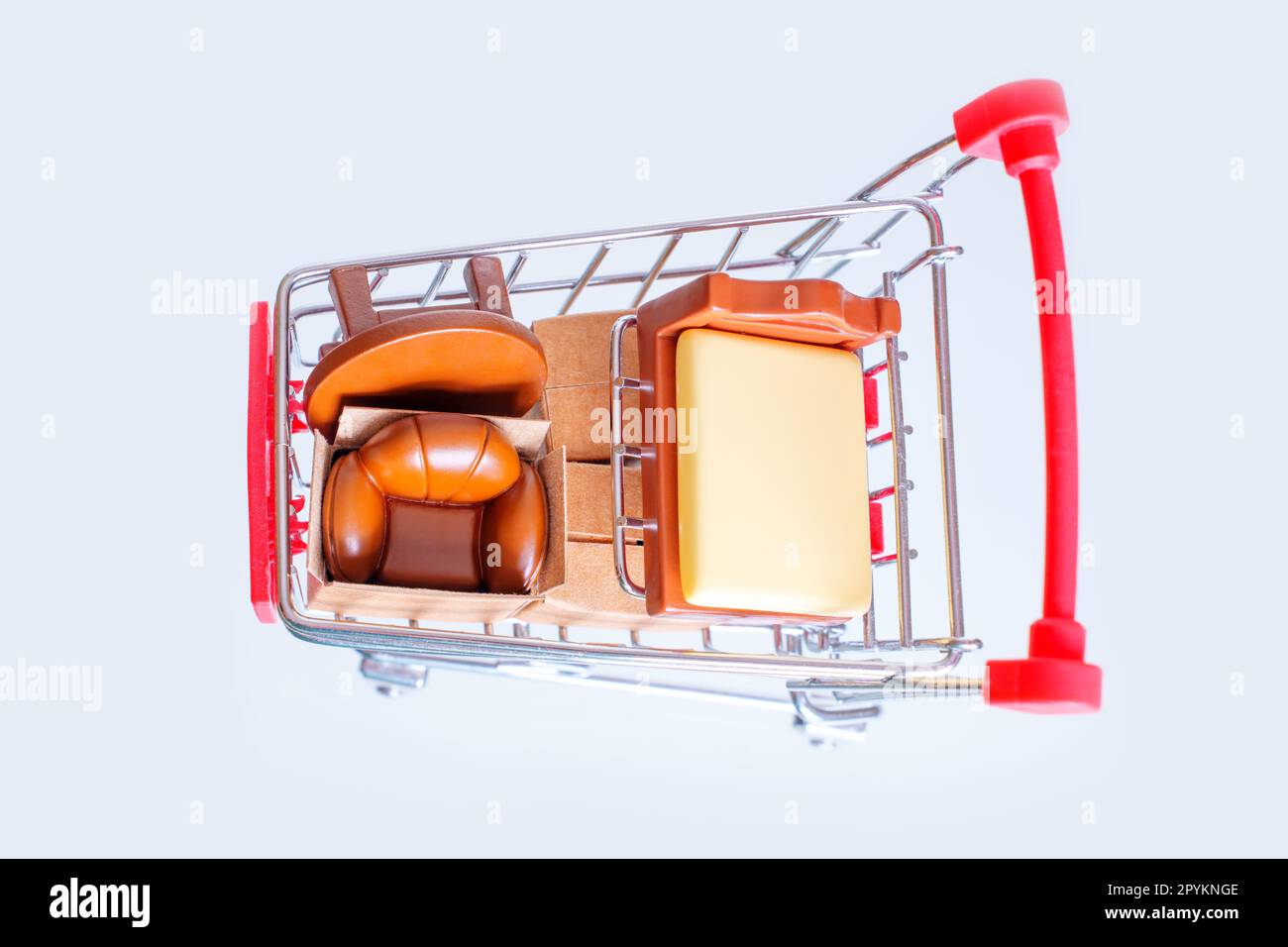 Top view of a miniature supermarket push cart carrying an assortment of ...