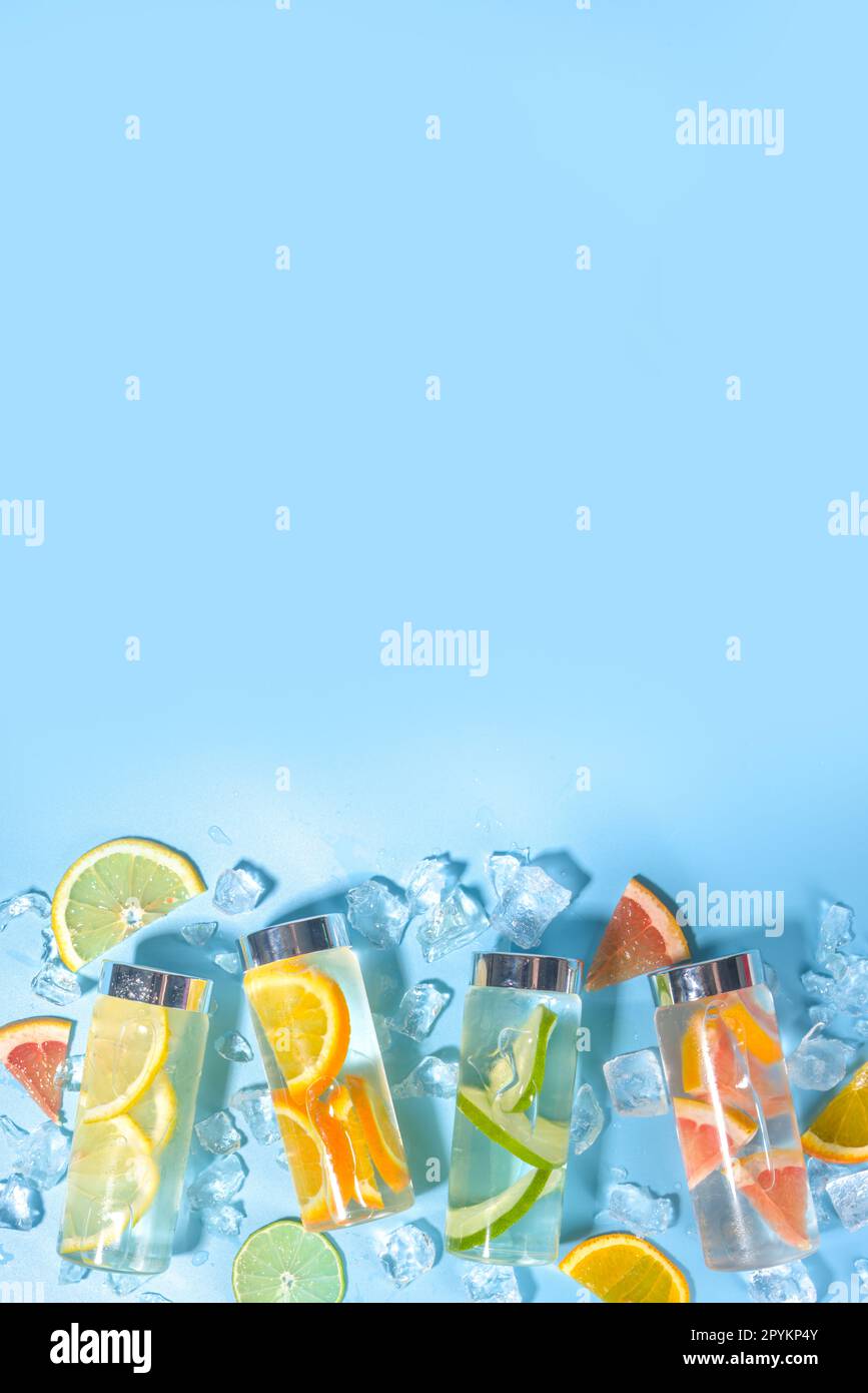 Variety of cold drinks in bottles, summer infused water bottles ...