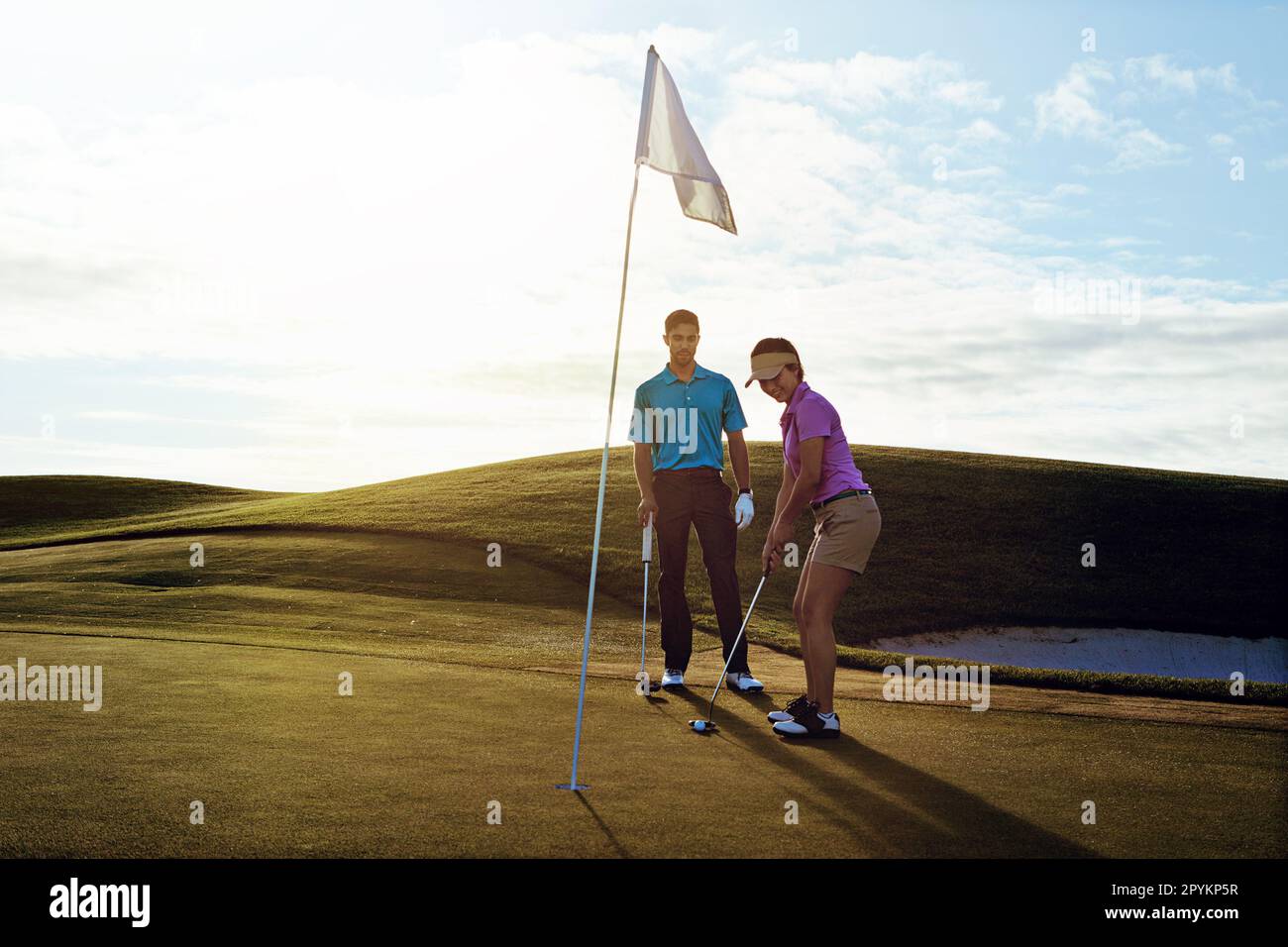 Couples who golf together grow together. a couple playing golf together ...