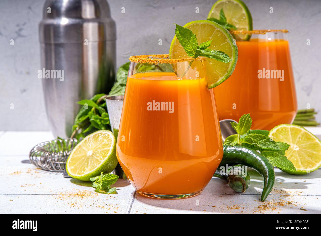 Carrot Ginger Margarita cocktail with lime, mint and hot chili pepper ...