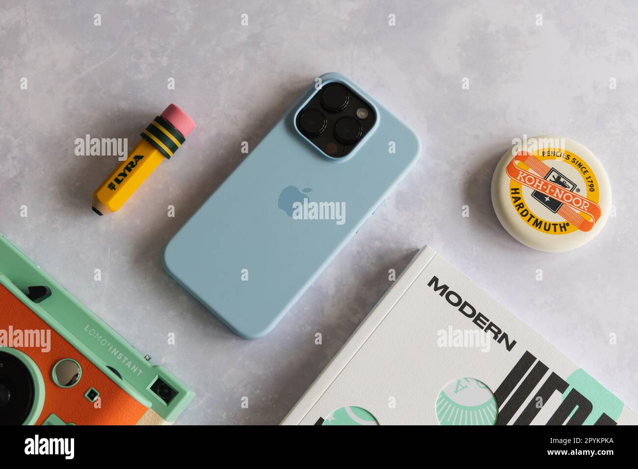 LONDON - APRIL 29, 2023: Apple iPhone 14 Pro in Sky blue silicone case ...