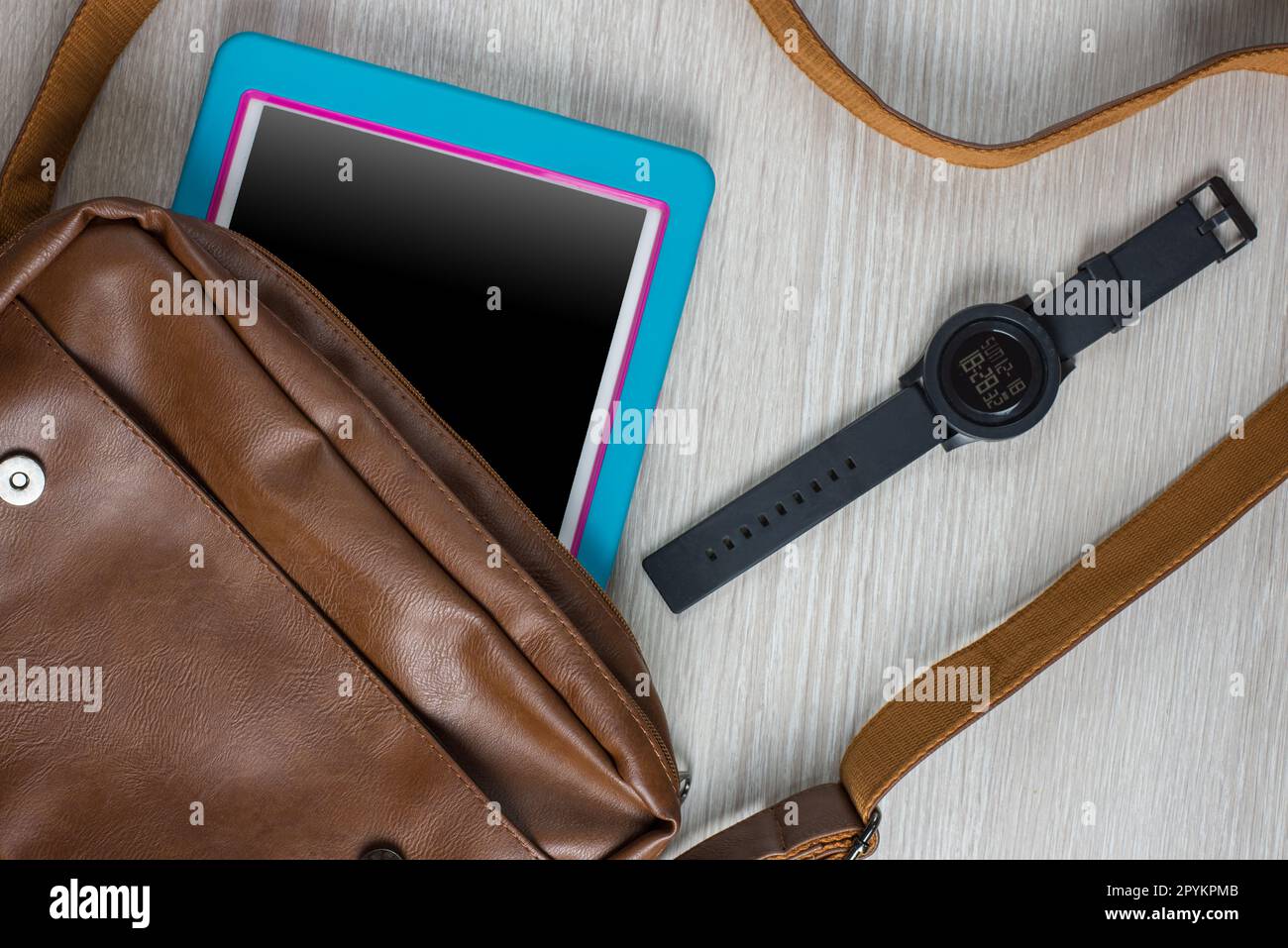 Flat lay of businessman tablet with watch and smartphone on table, top ...