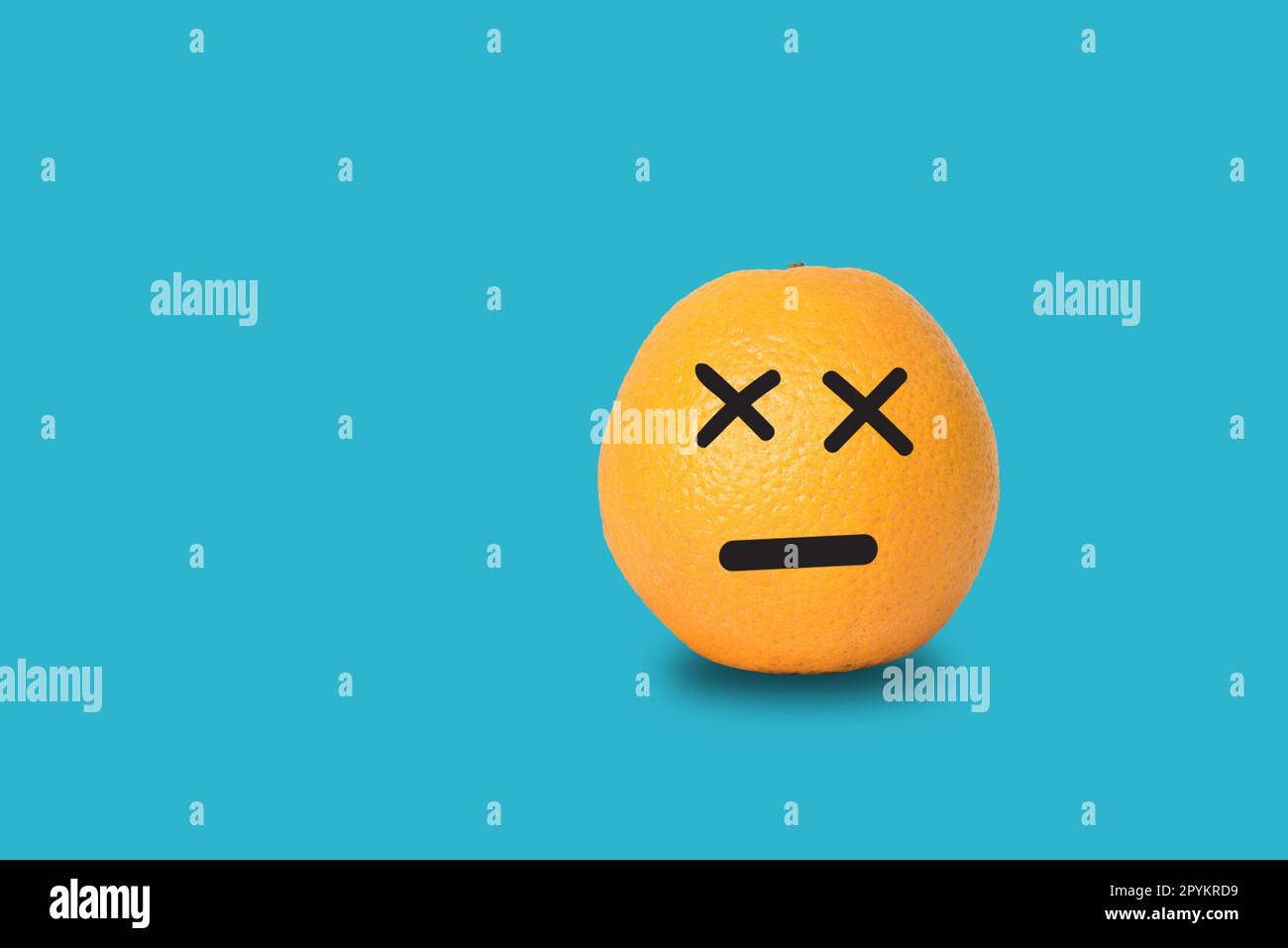 Orange face numb on blue background Stock Photo - Alamy