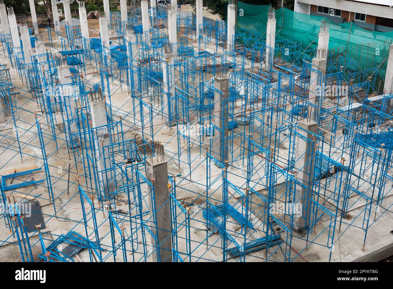 Build construction with steel scaffolding around raw structure Stock ...