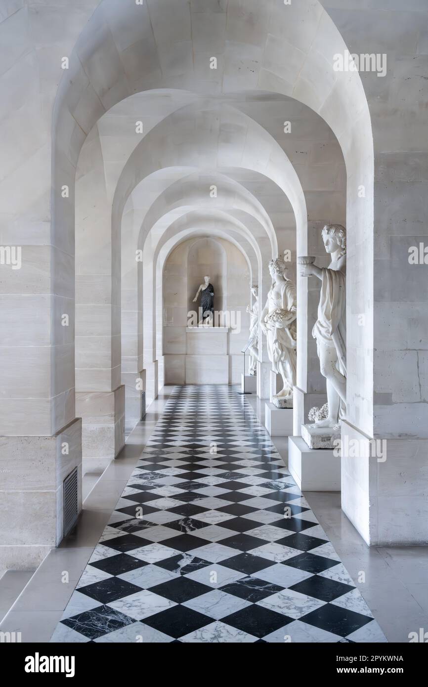 Marble statues in the historical hallway Ground Gallery of Versailles ...