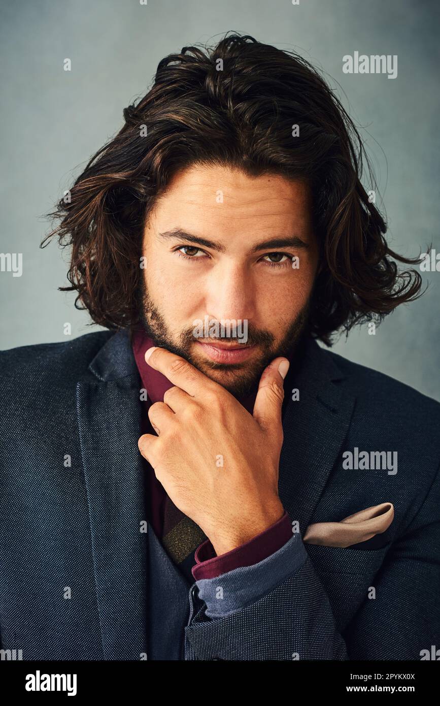 Hes handsome and a thinker. Studio portrait of a stylishly dressed ...