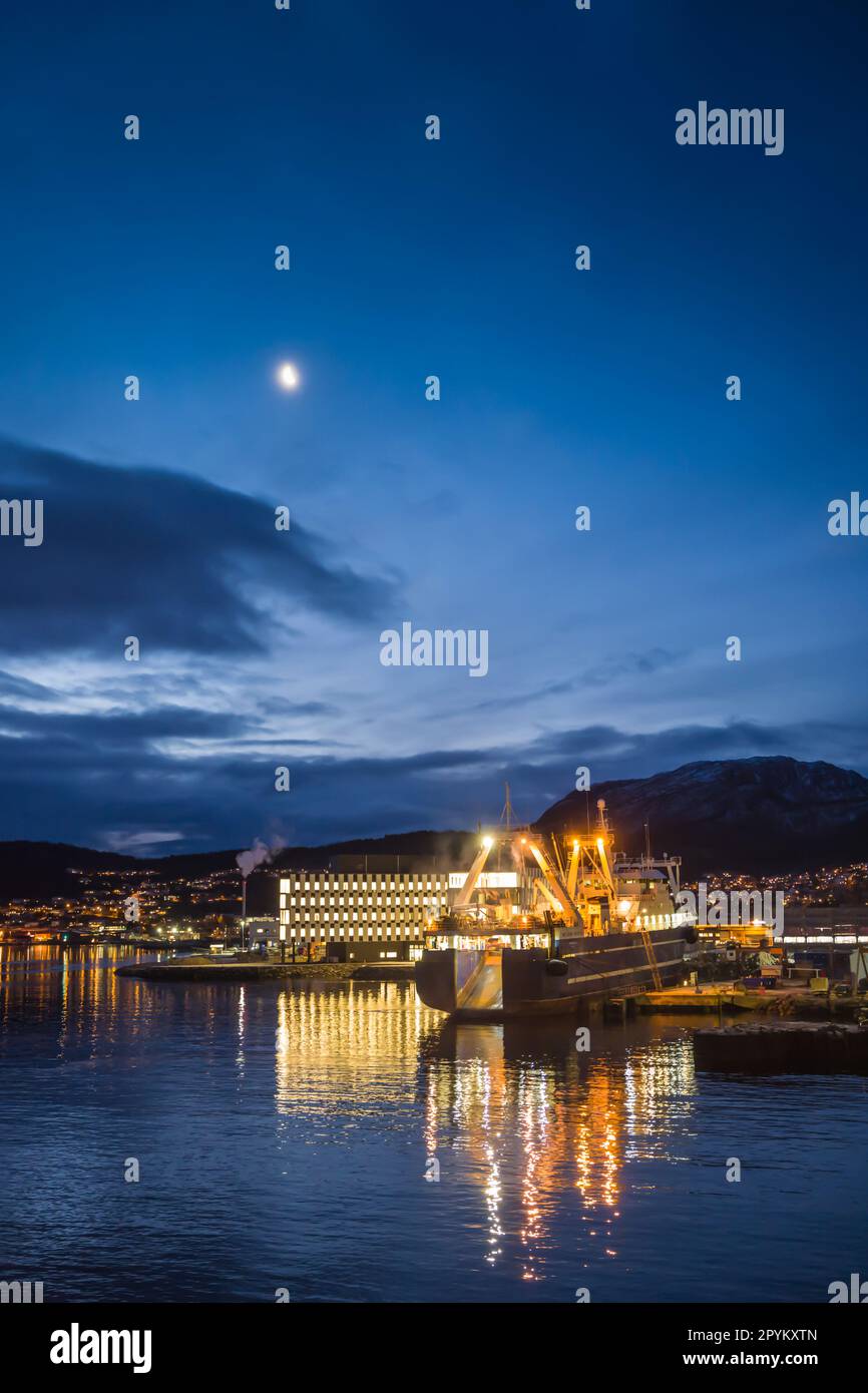 Early morning at Harstad harbour ship repair yard, Arctic Norway Stock ...