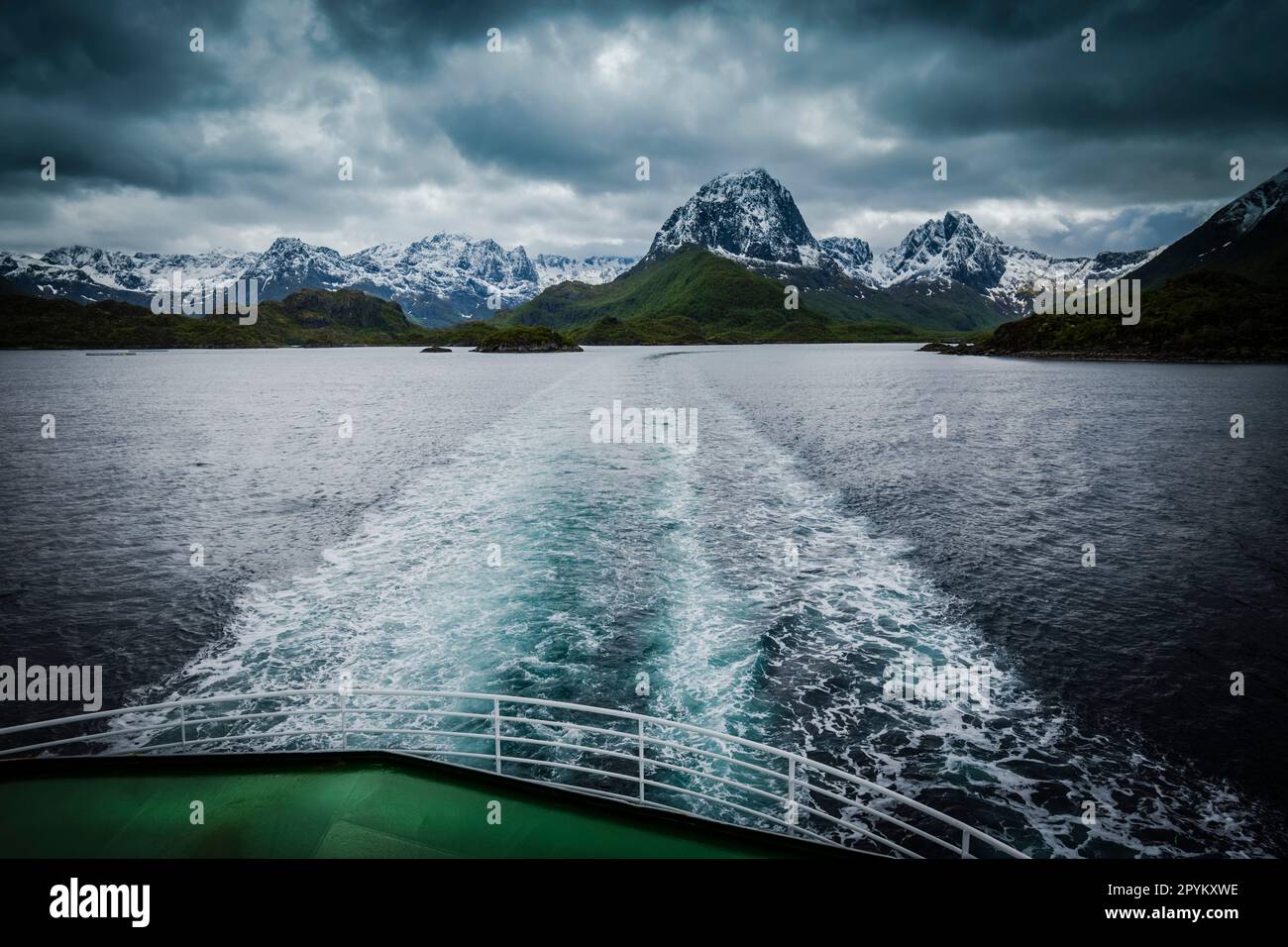 Looking back over the stern of a ferry crossing a Norwegian fjord Stock ...