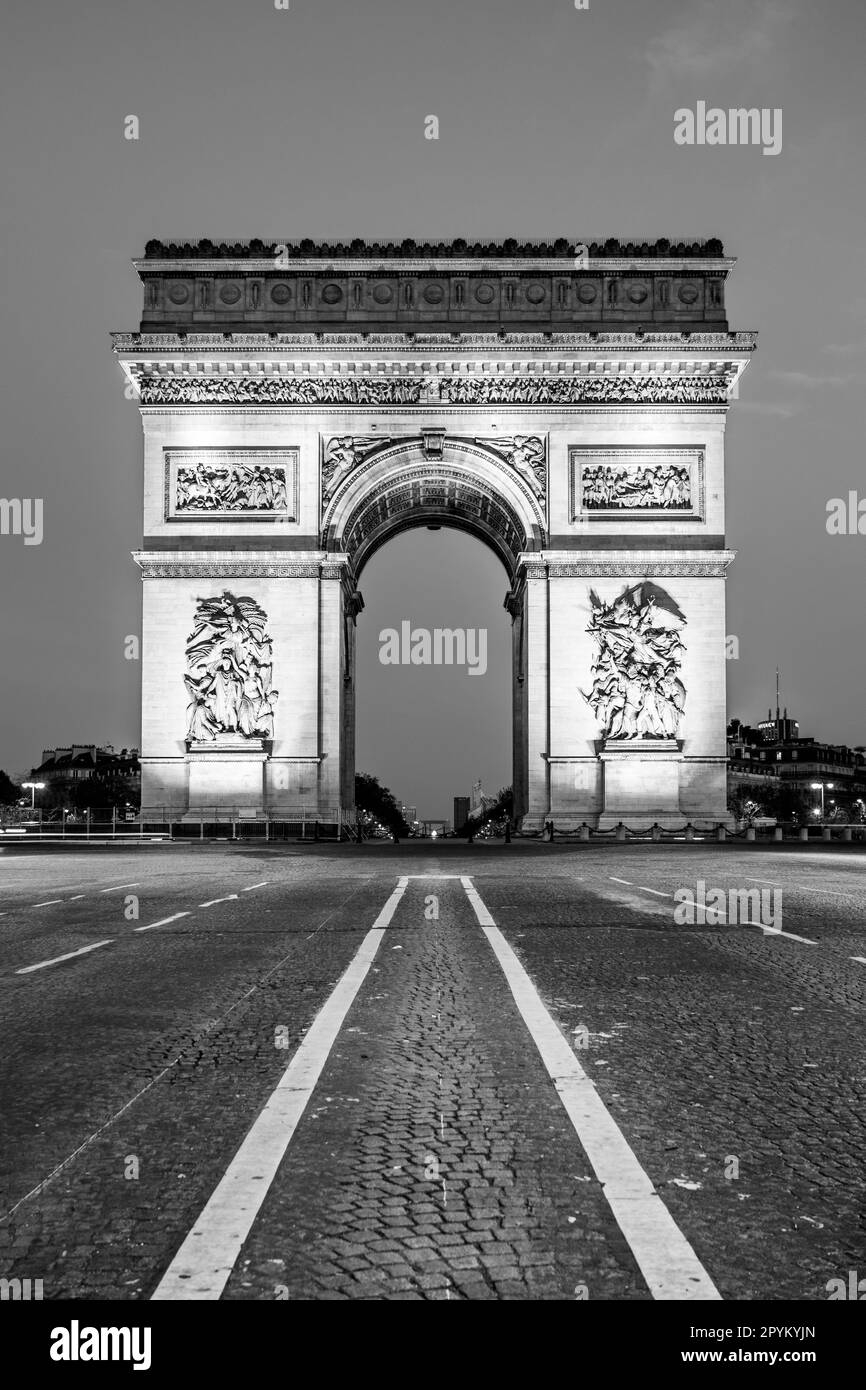 Arc de Triomphe de l Etoile at the top of the Champs-Elysees boulevard by night, Paris, France ...