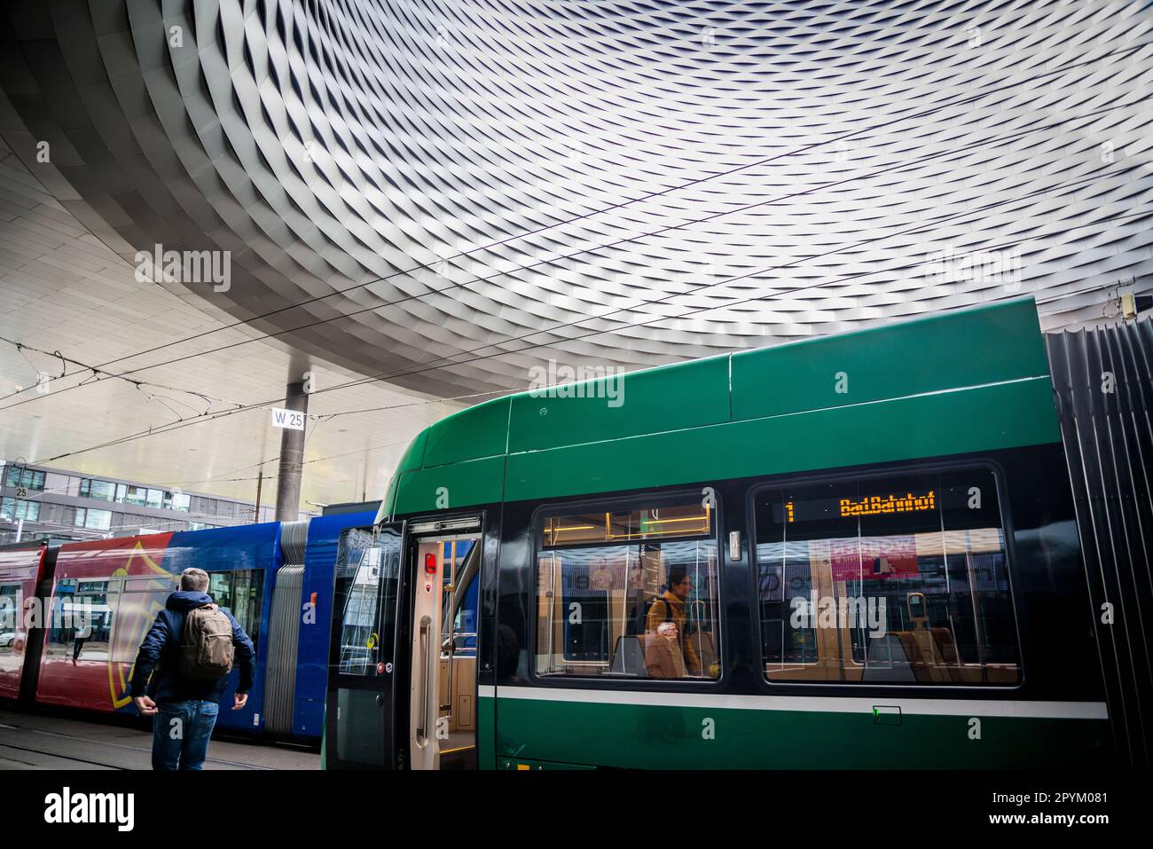 Tram passing through Basel exhibition centre, the new Messe Basel trade ...