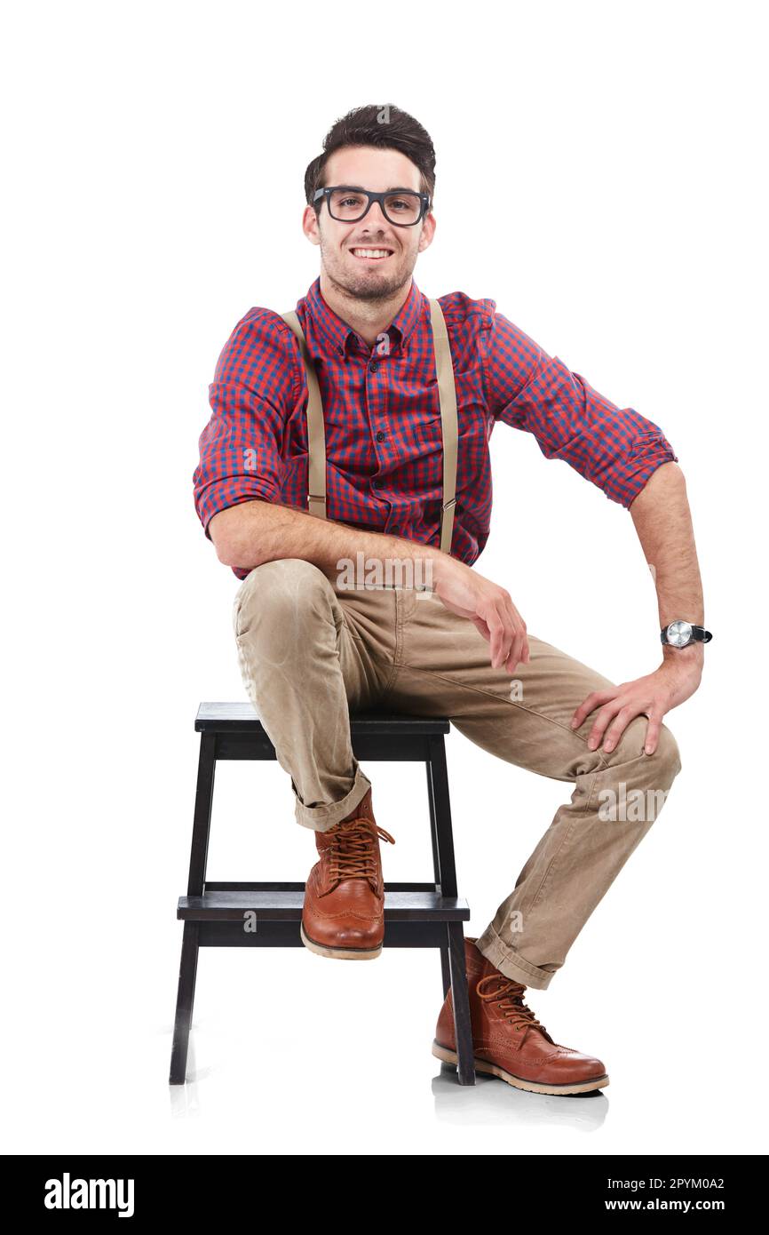 Glasses, chair and portrait of man in nerd fashion and suspenders ...