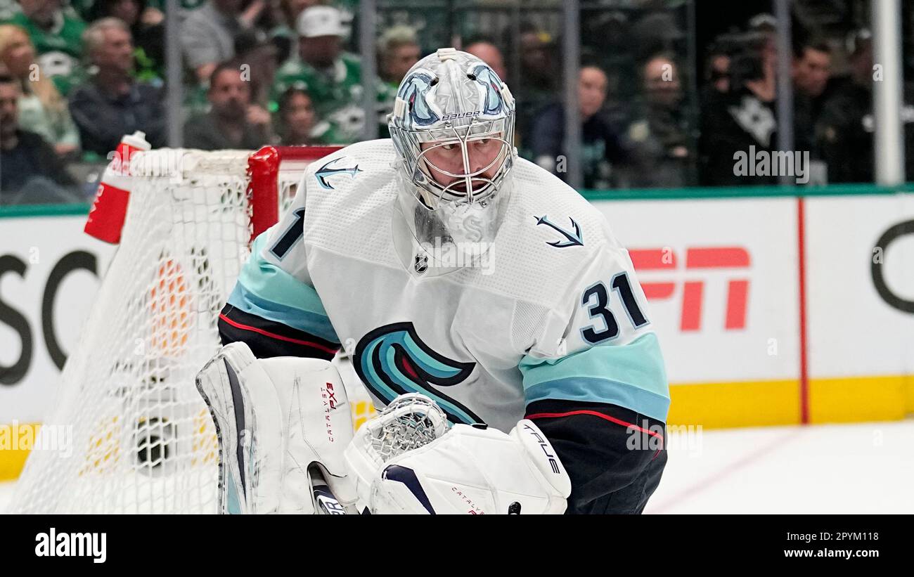 Seattle Kraken goaltender Philipp Grubauer stops a loose puck during ...