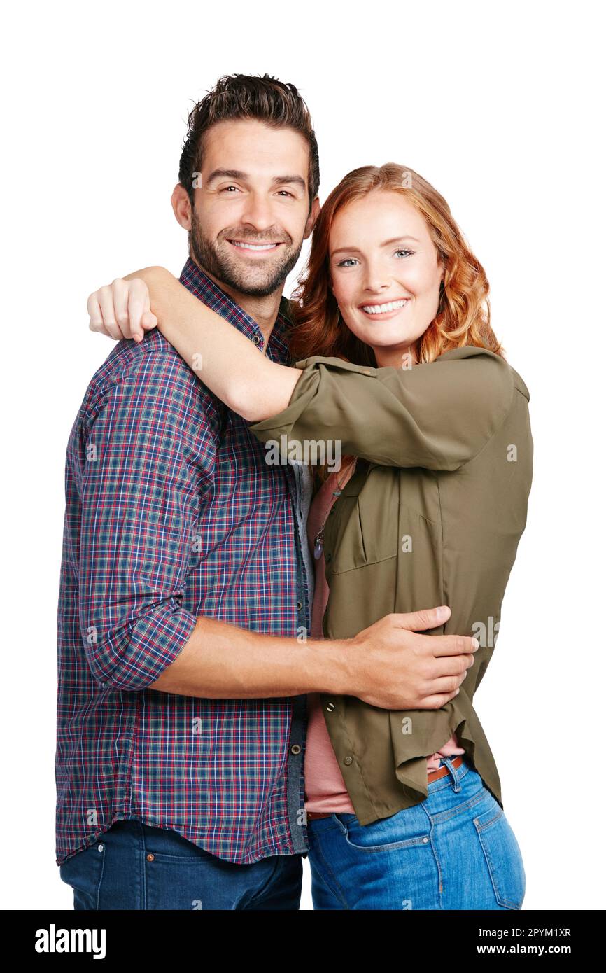 They Are The Cutest Couple Ever A Couple Posing Against A White