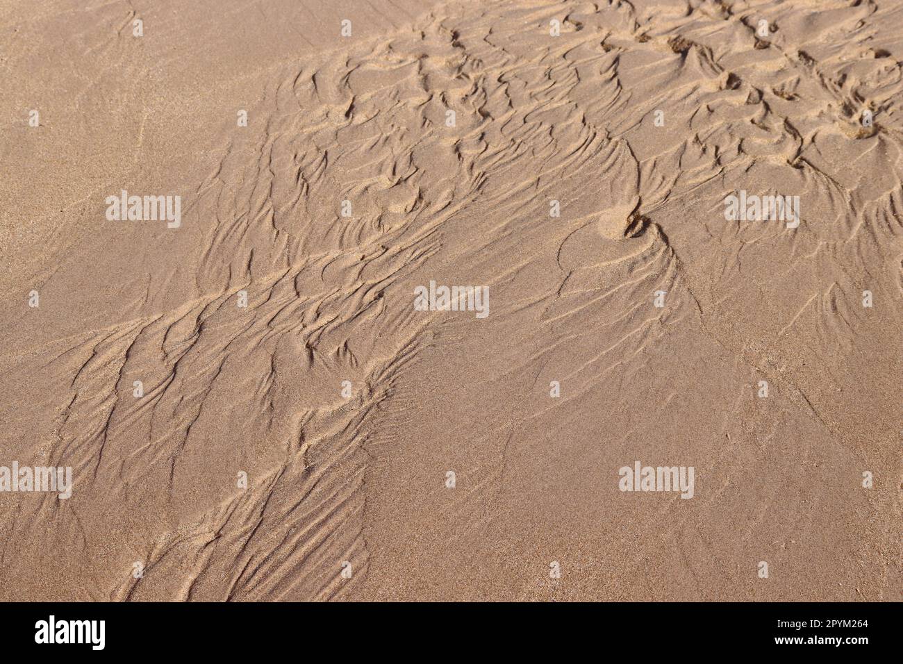 Texture and patterns in sand Stock Photo - Alamy