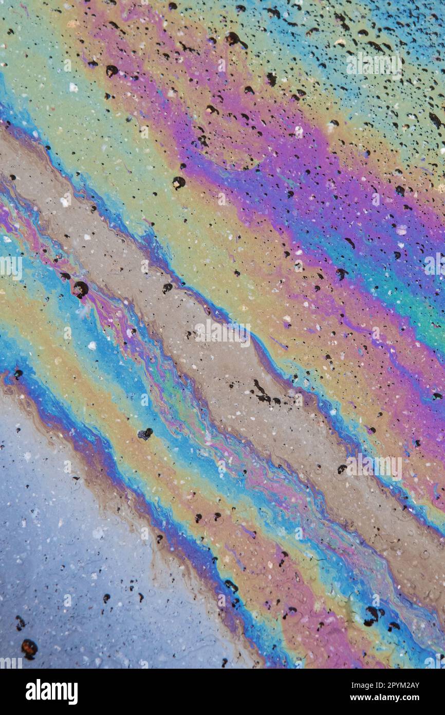 Vertical. Color Gasoline fuel spots on Asphalt Road as Texture or ...