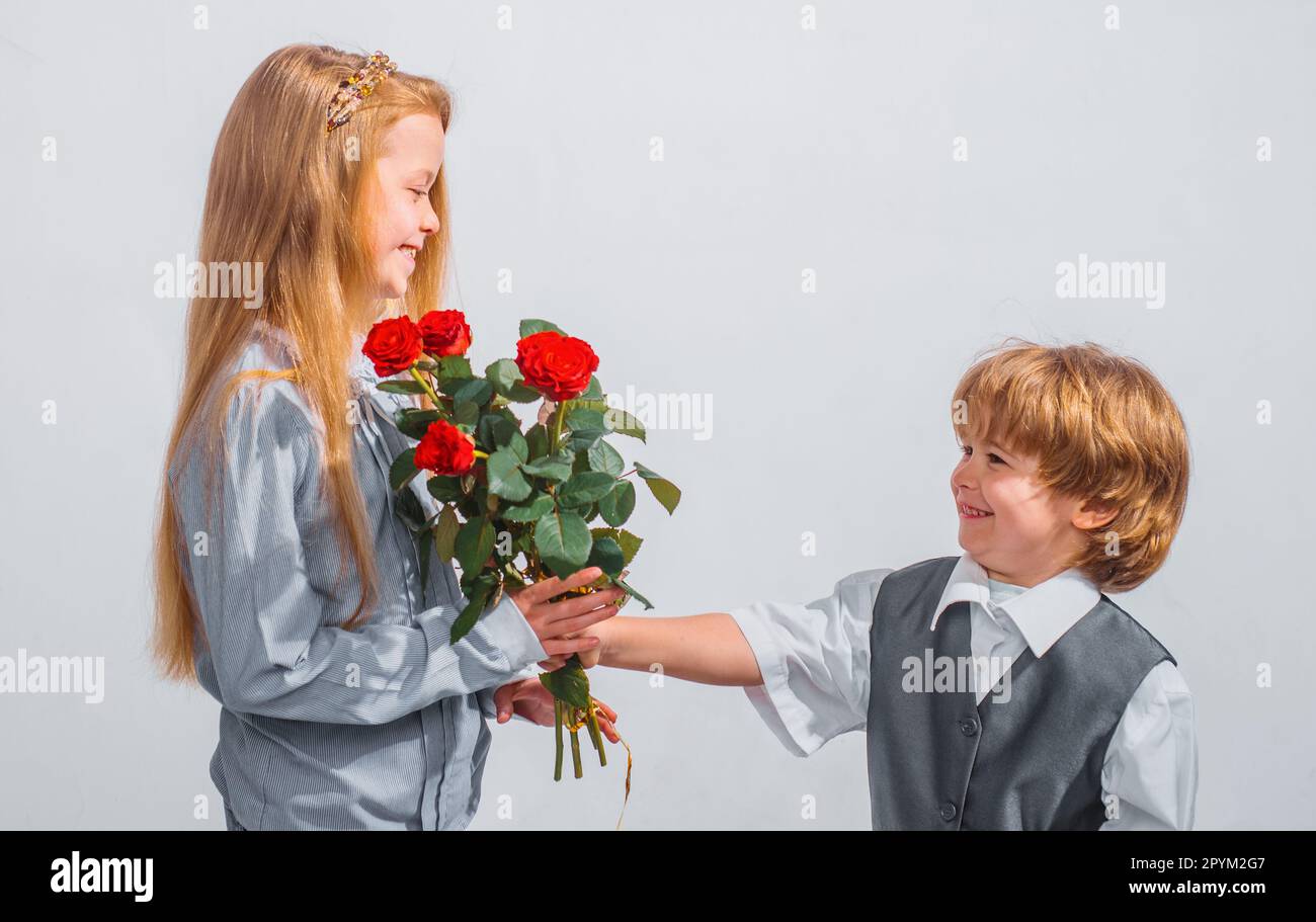 Little Boy with a rose for his teen girlfriend, romantic children ...