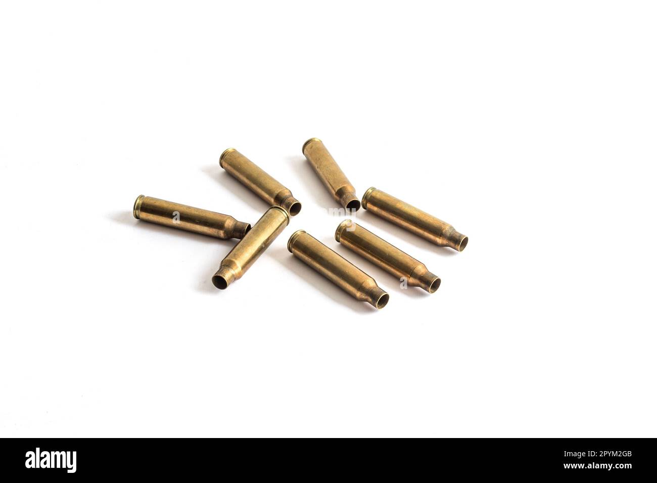 The empty rifle bullet casings, isolated on white background Stock ...