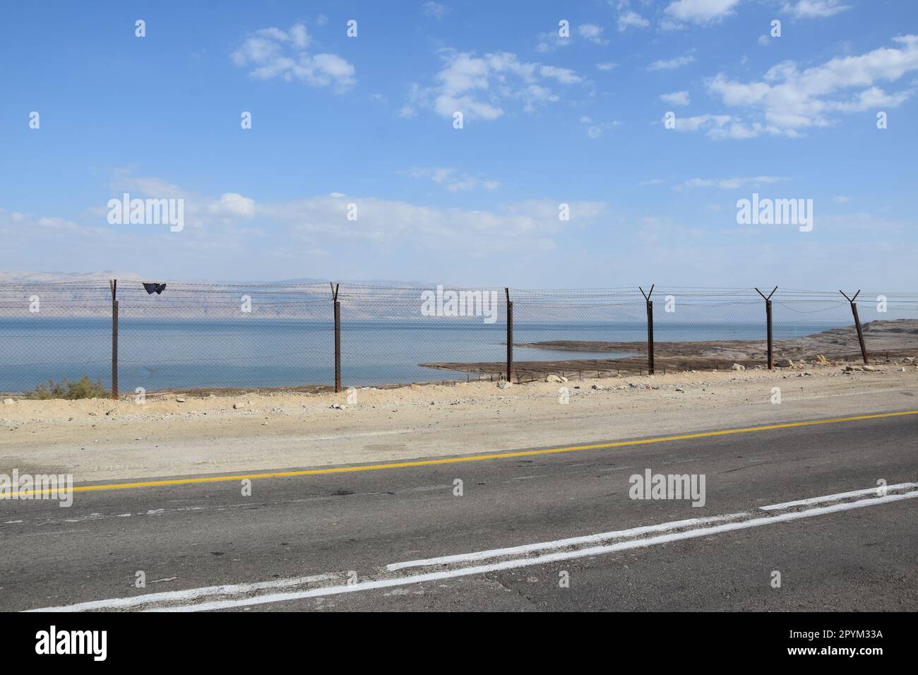 Driving south on route 90 to the Dead Sea through the barren desert ...