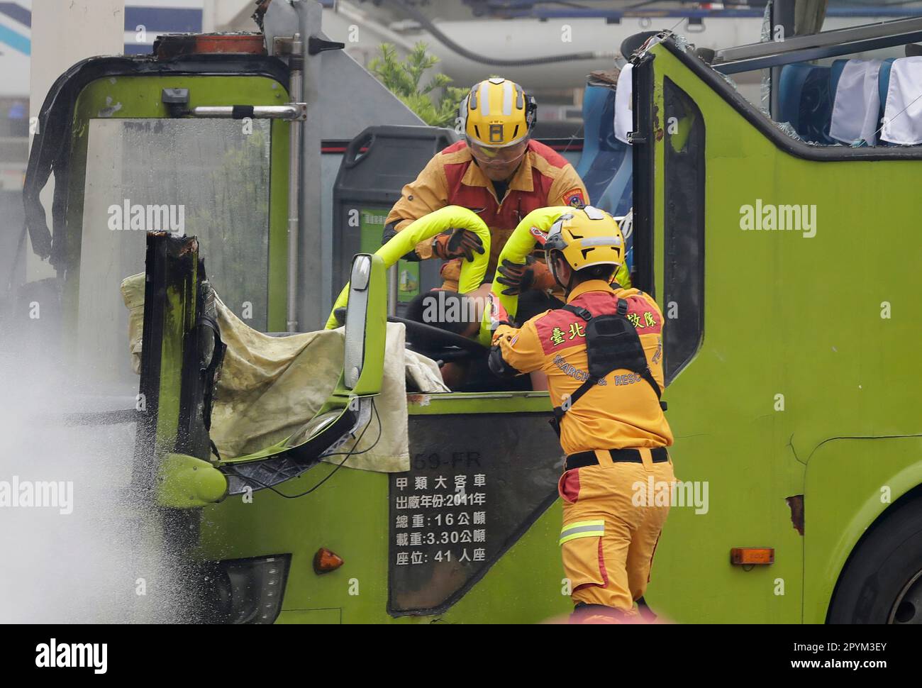 Rescue team members make an operation of a traffic accident scene ...