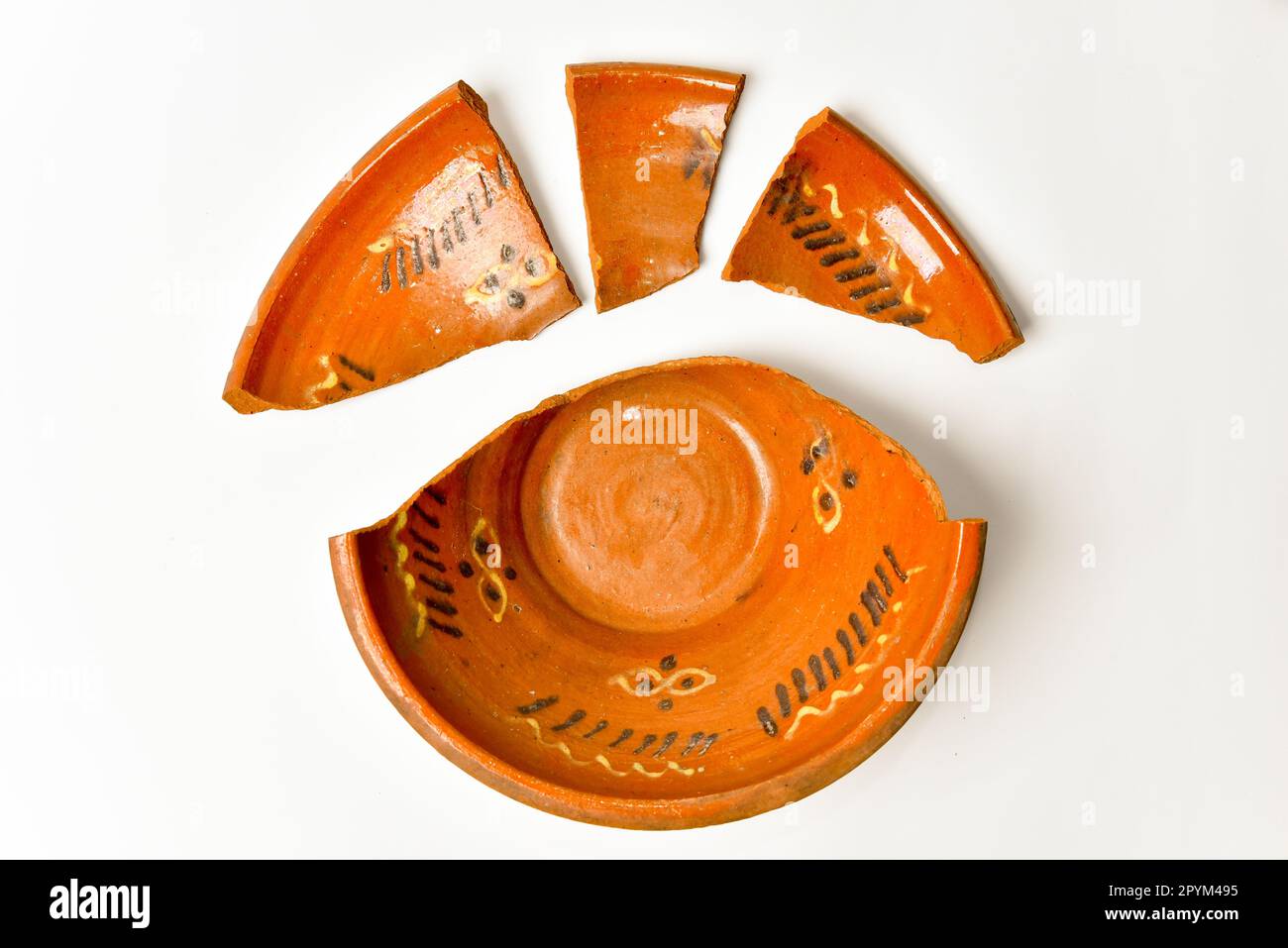 Broken porcelain kitchenware top view. Cracked ceramics plate on white ...