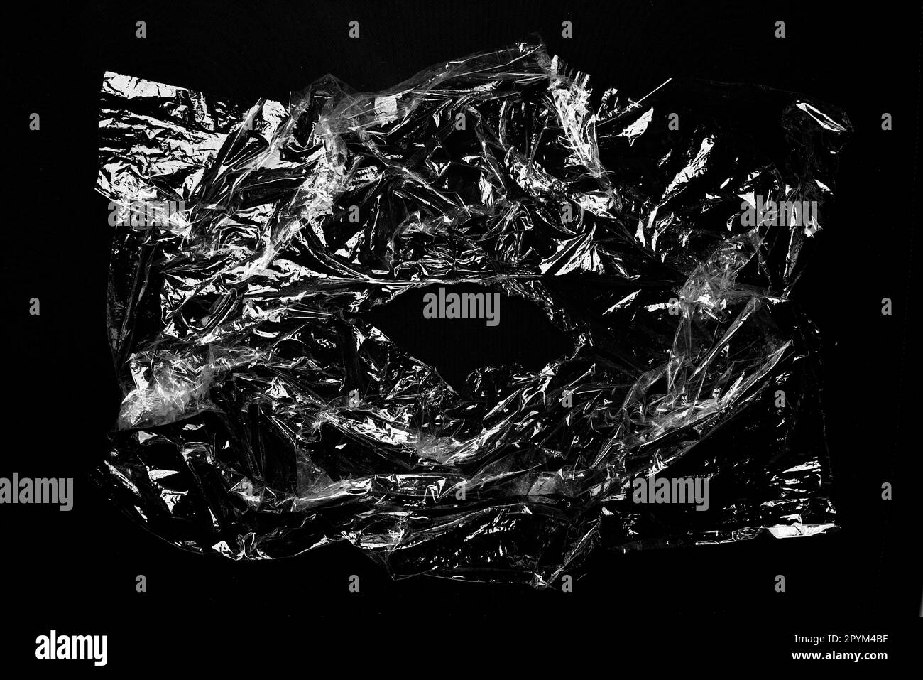Torn plastic bag Black and White Stock Photos & Images - Alamy